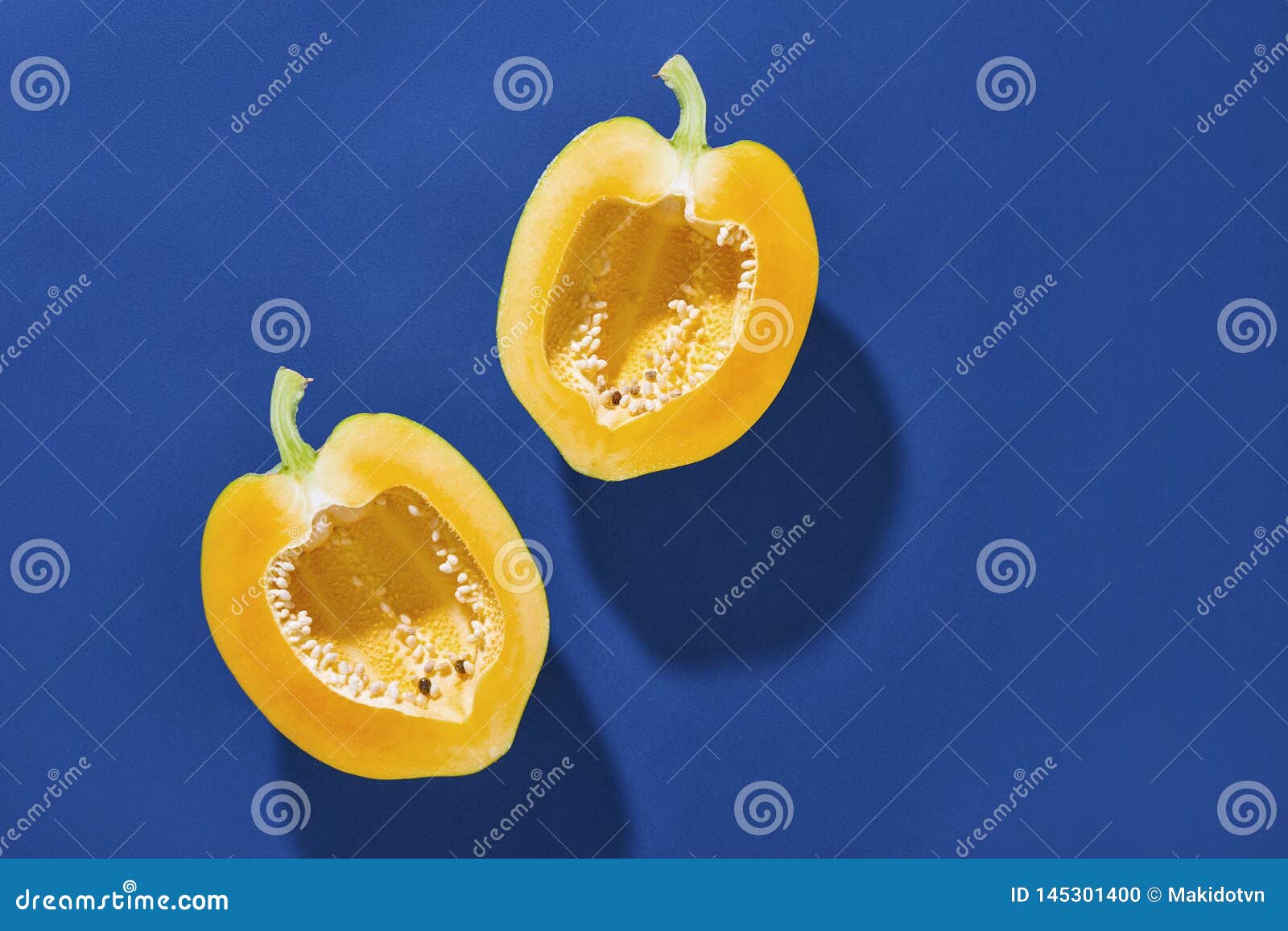 Tropical Papaya Halves Isolated on Blue Stock Photo - Image of isolated ...