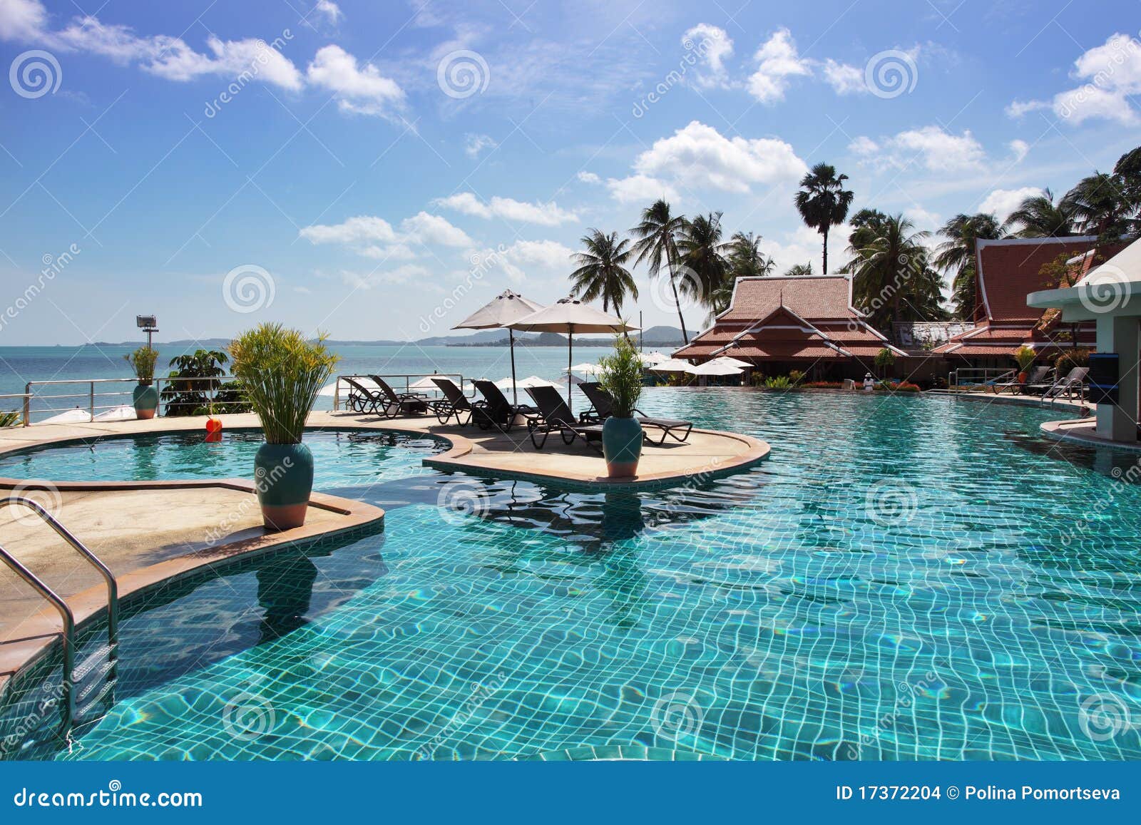 Tropical Resort. Poolside and Sea View Stock Photo - Image of idyllic ...