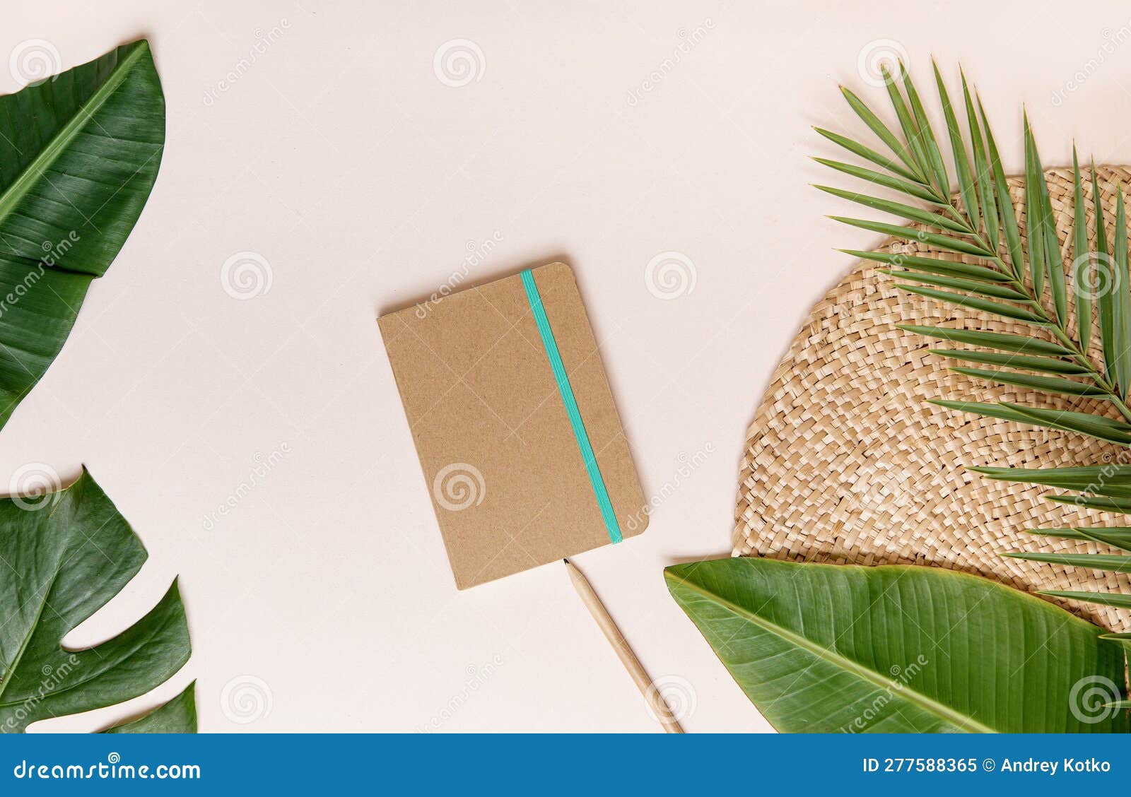 Tropical Workspace Concept. Notepad and Tropical Palm Leaves. Mockup ...