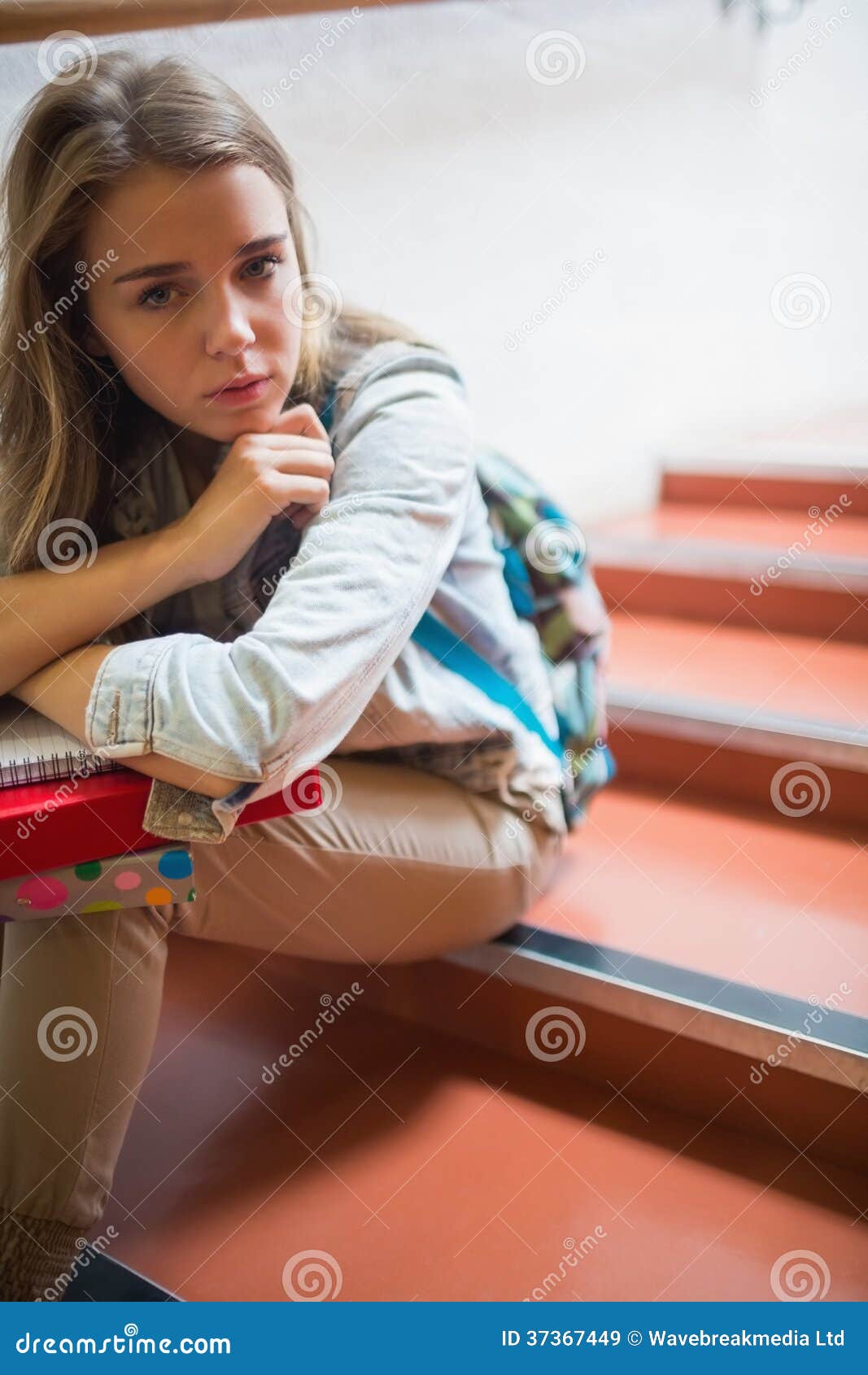 Troubled Lonely Student Sitting on Stairs Looking at Camera Stock Image ...