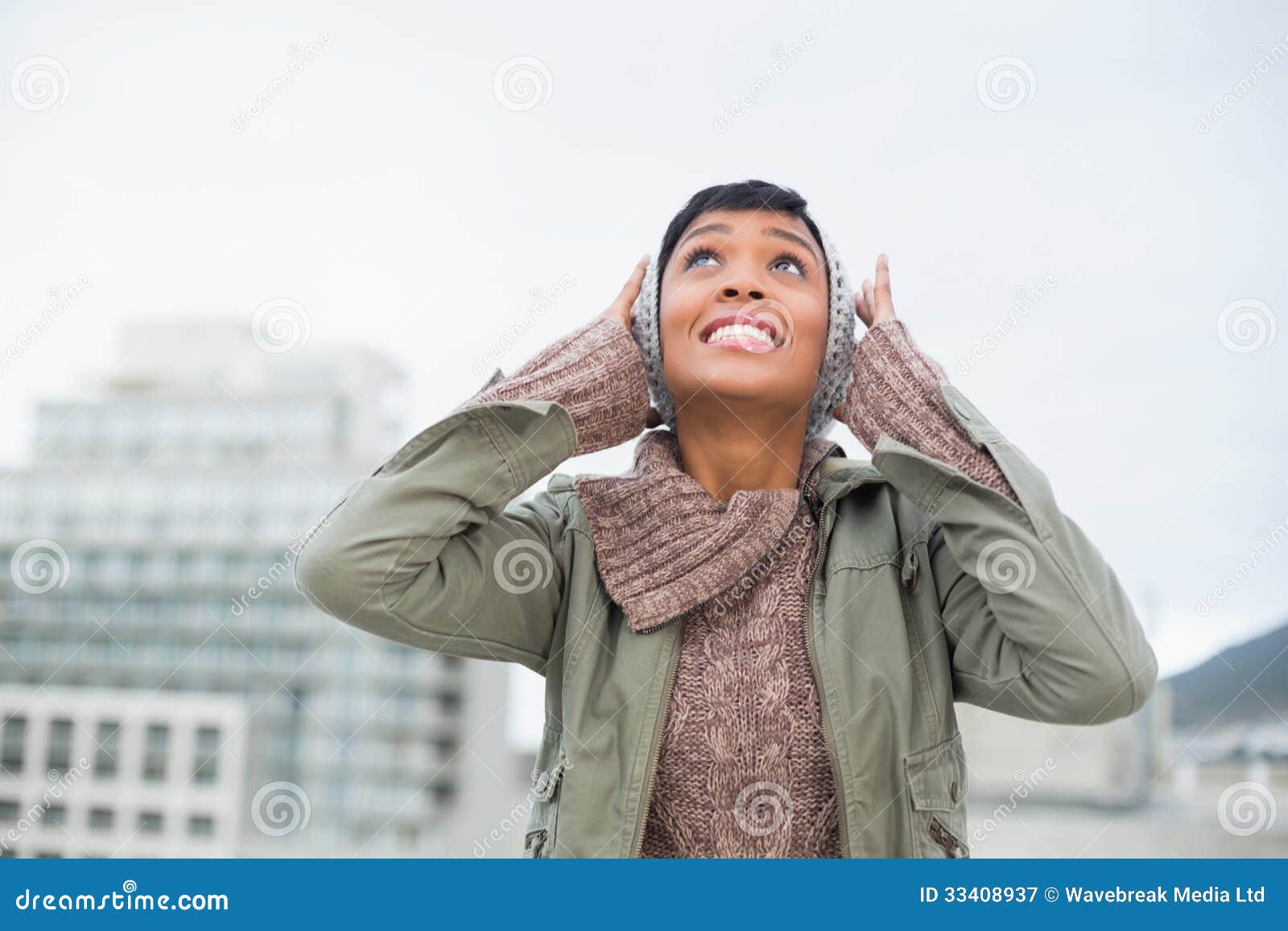 Troubled Young Model in Winter Clothes Clogging Her Ears Stock Image ...