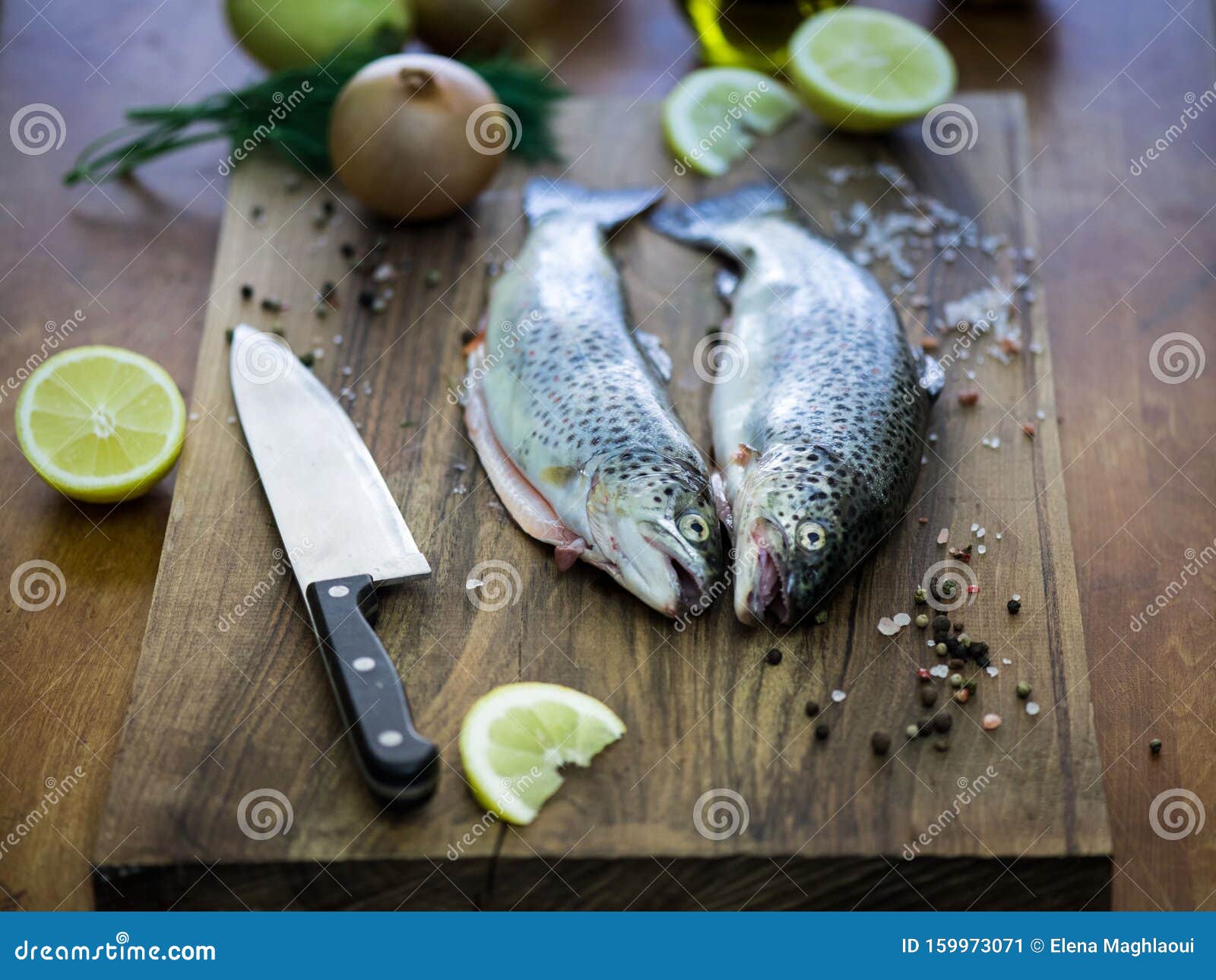 Trout. Fresh Fish with Spices, Lemon and Onions. Stock Image - Image of ...