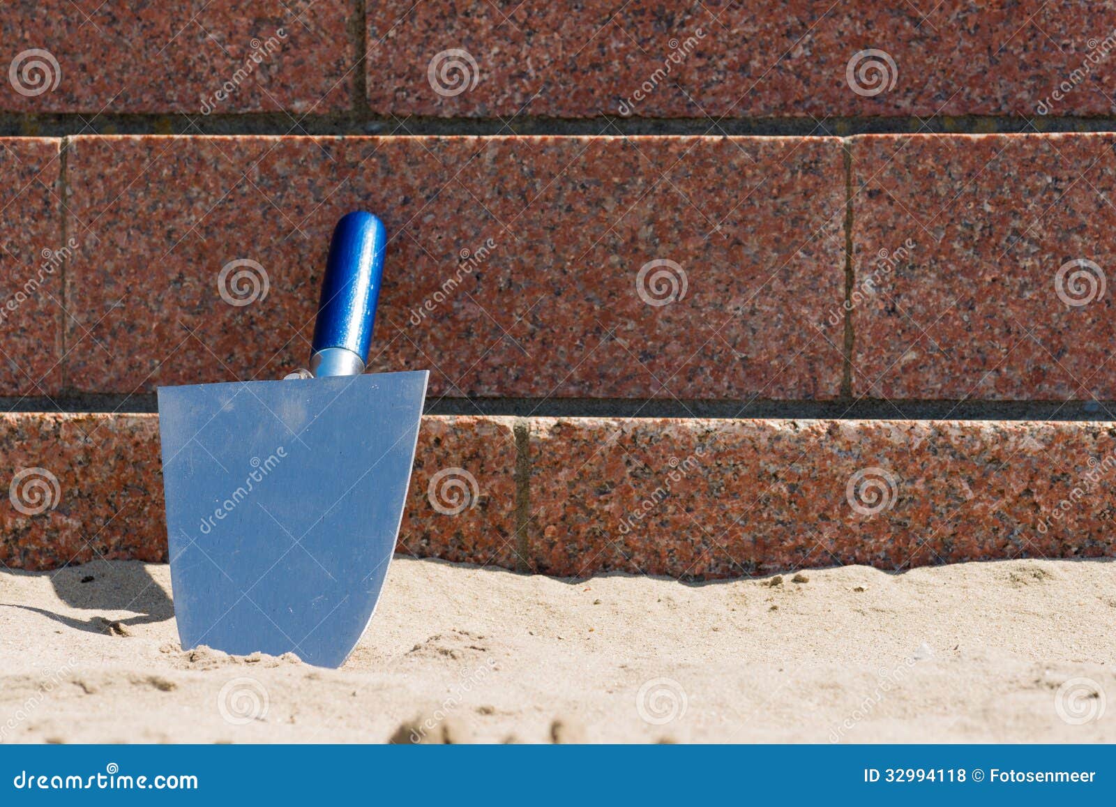 Trowel on the beach stock photo. Image of contracting - 32994118