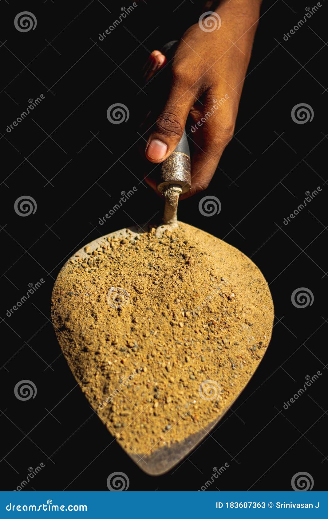 Trowel Isolated on Black Background. Sand and Cement Mixed on the ...