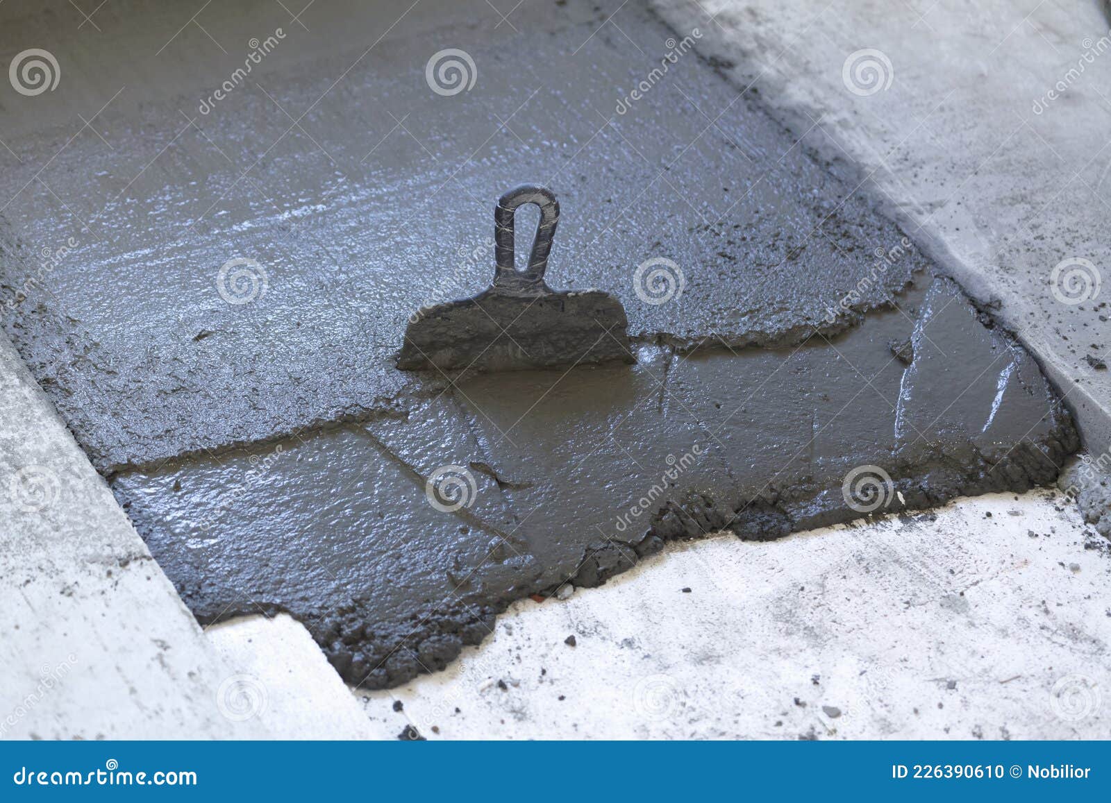 A Trowel in a Layer of Fresh Concrete Stock Photo - Image of home ...