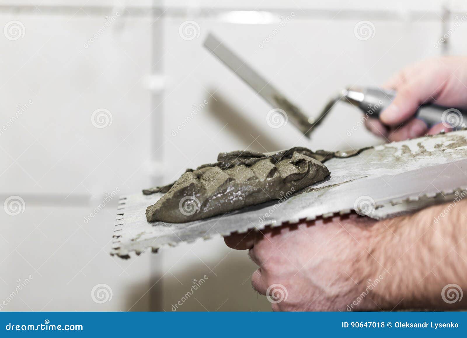 Trowel in a man hand stock photo. Image of plasterer - 90647018