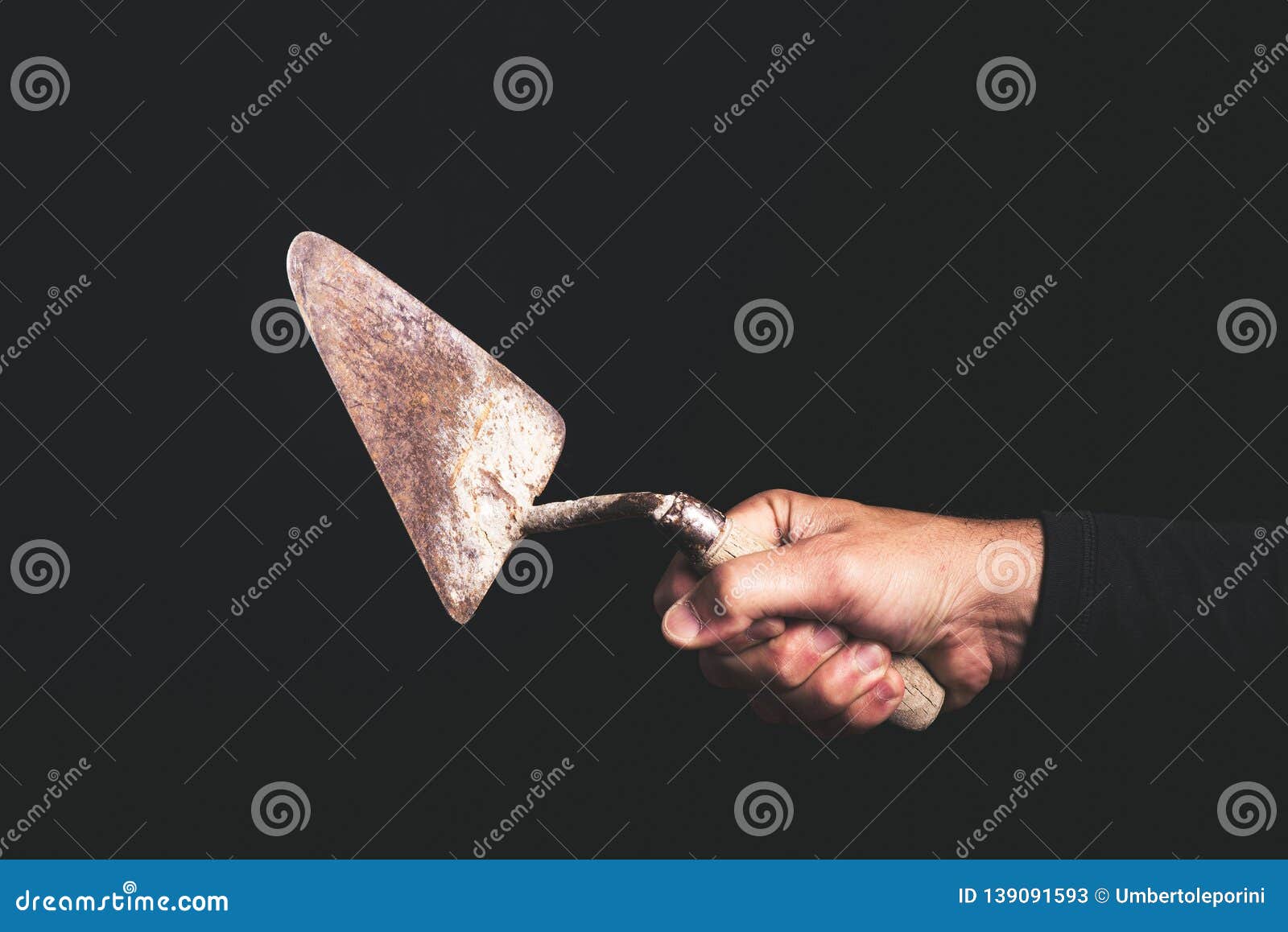 Trowel Tools in a Man Hand - Maintenance Service Concept Stock Image ...
