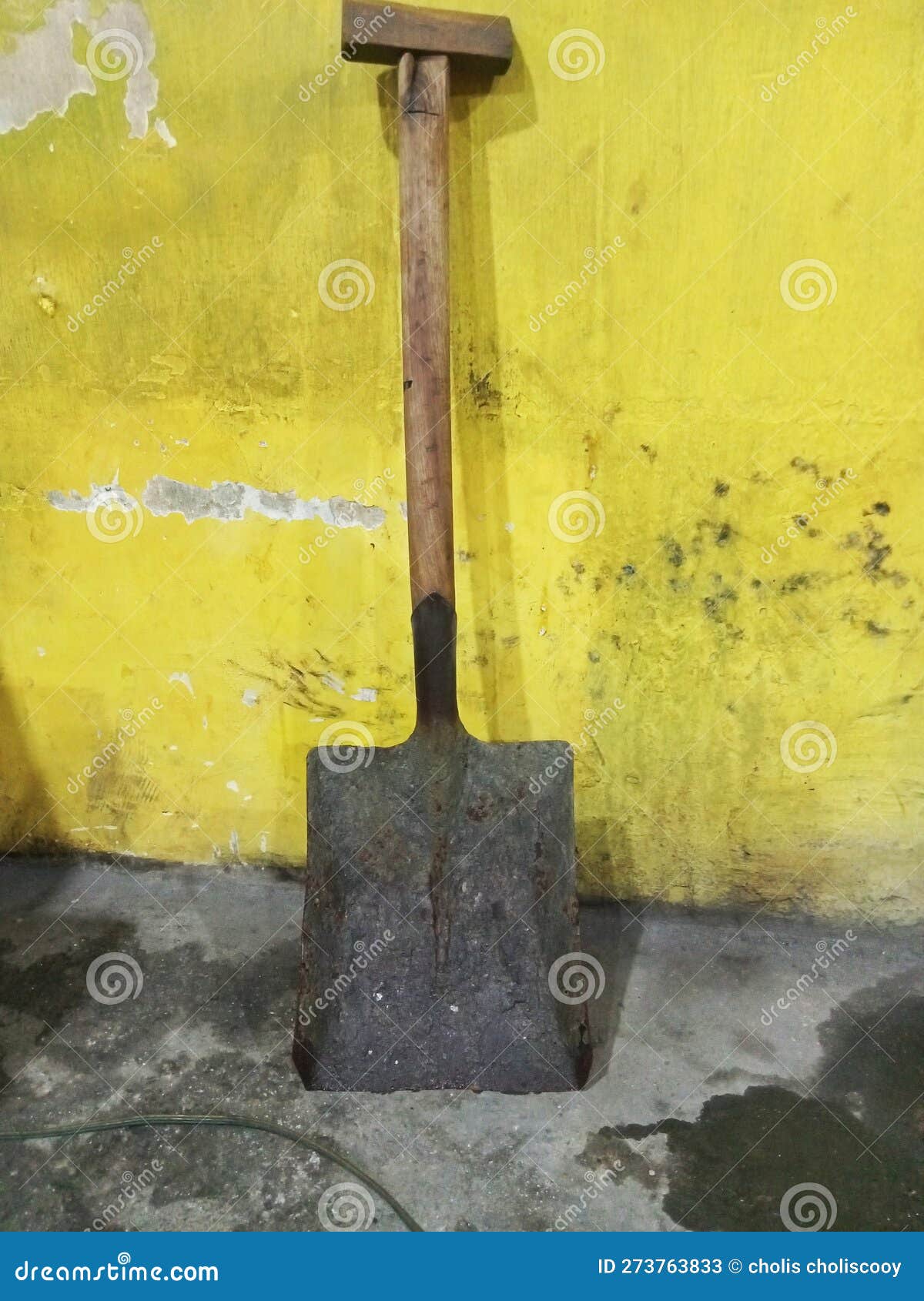 Trowel on Yellow Wall in the Floor Stock Image - Image of floor, wall ...