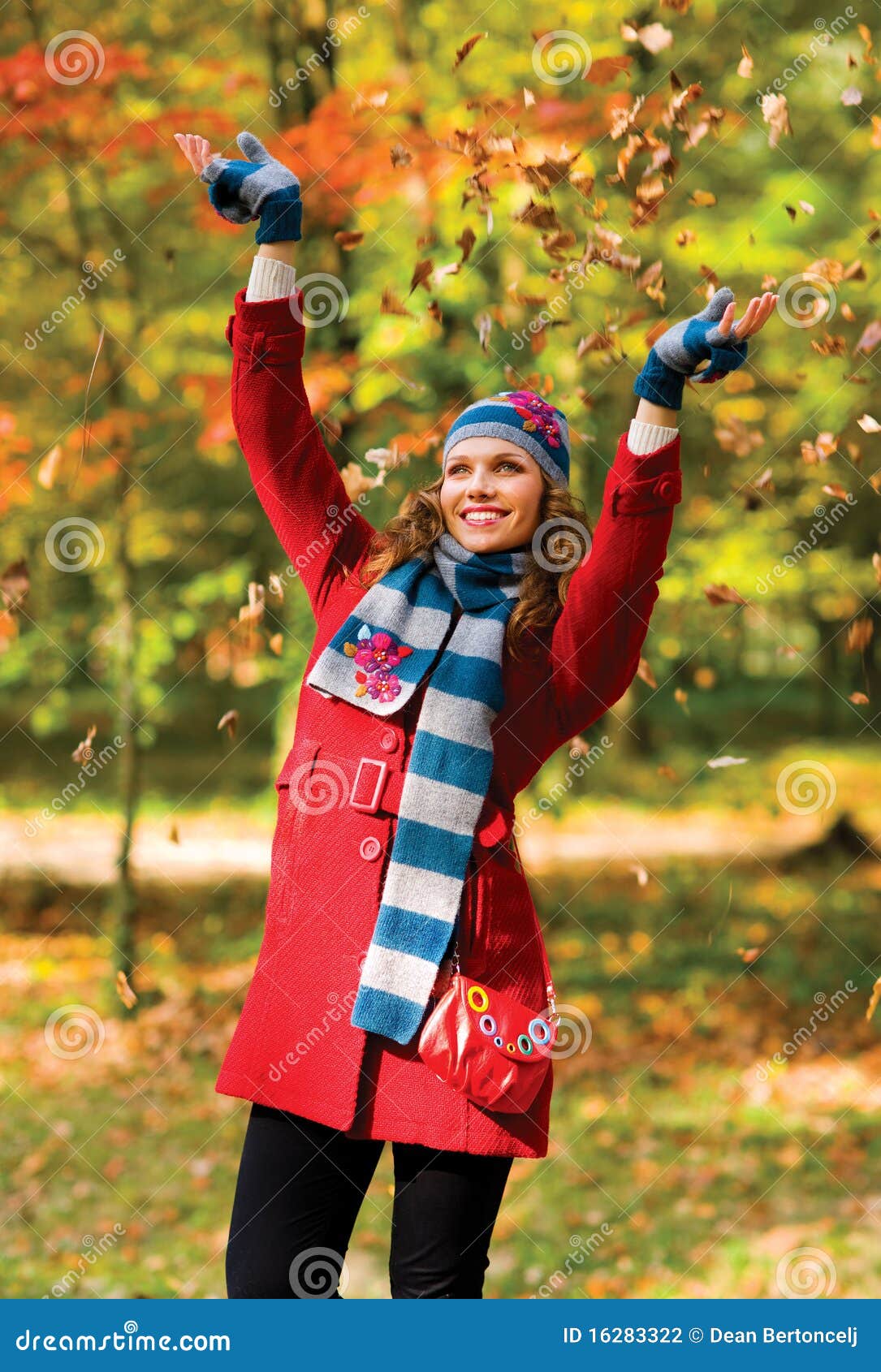 Trowing leaves stock photo. Image of style, female, autumn - 16283322
