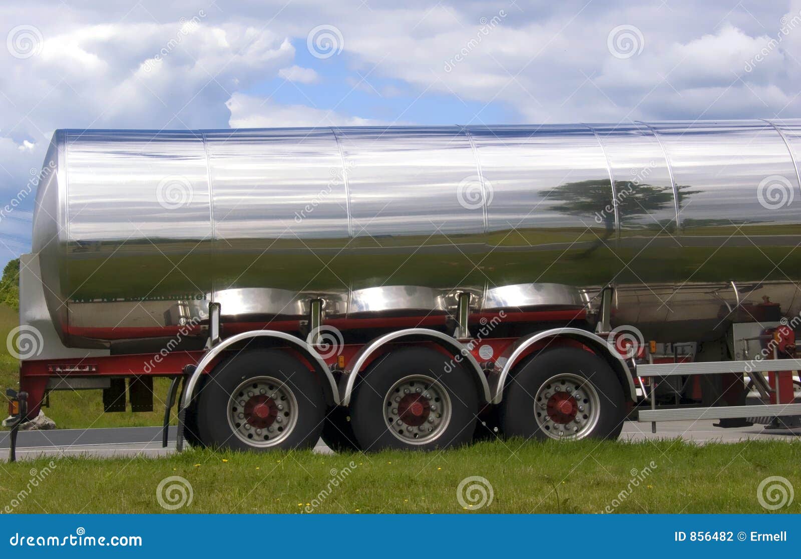 Road Through Tank Farms With Huge Rusty Petroleum Tanks On Either Side ...