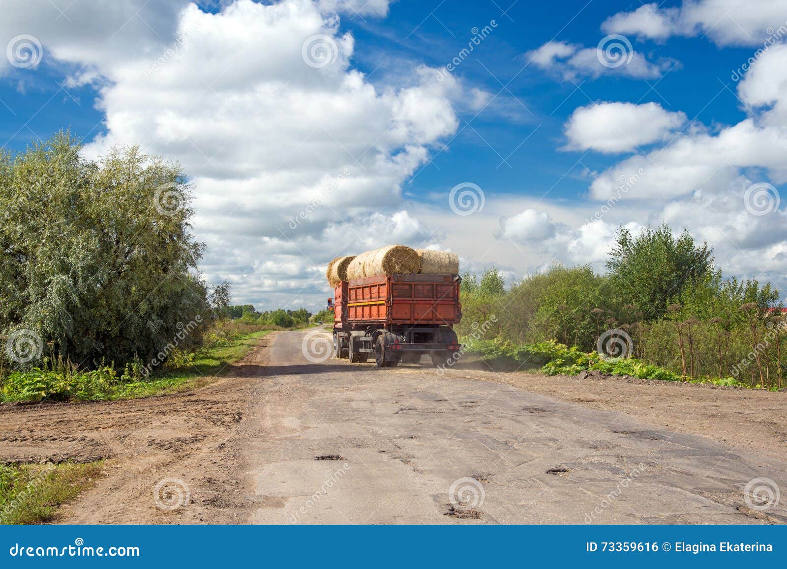Truck with Bales of Hay Rides on the Road Stock Photo - Image of nature ...