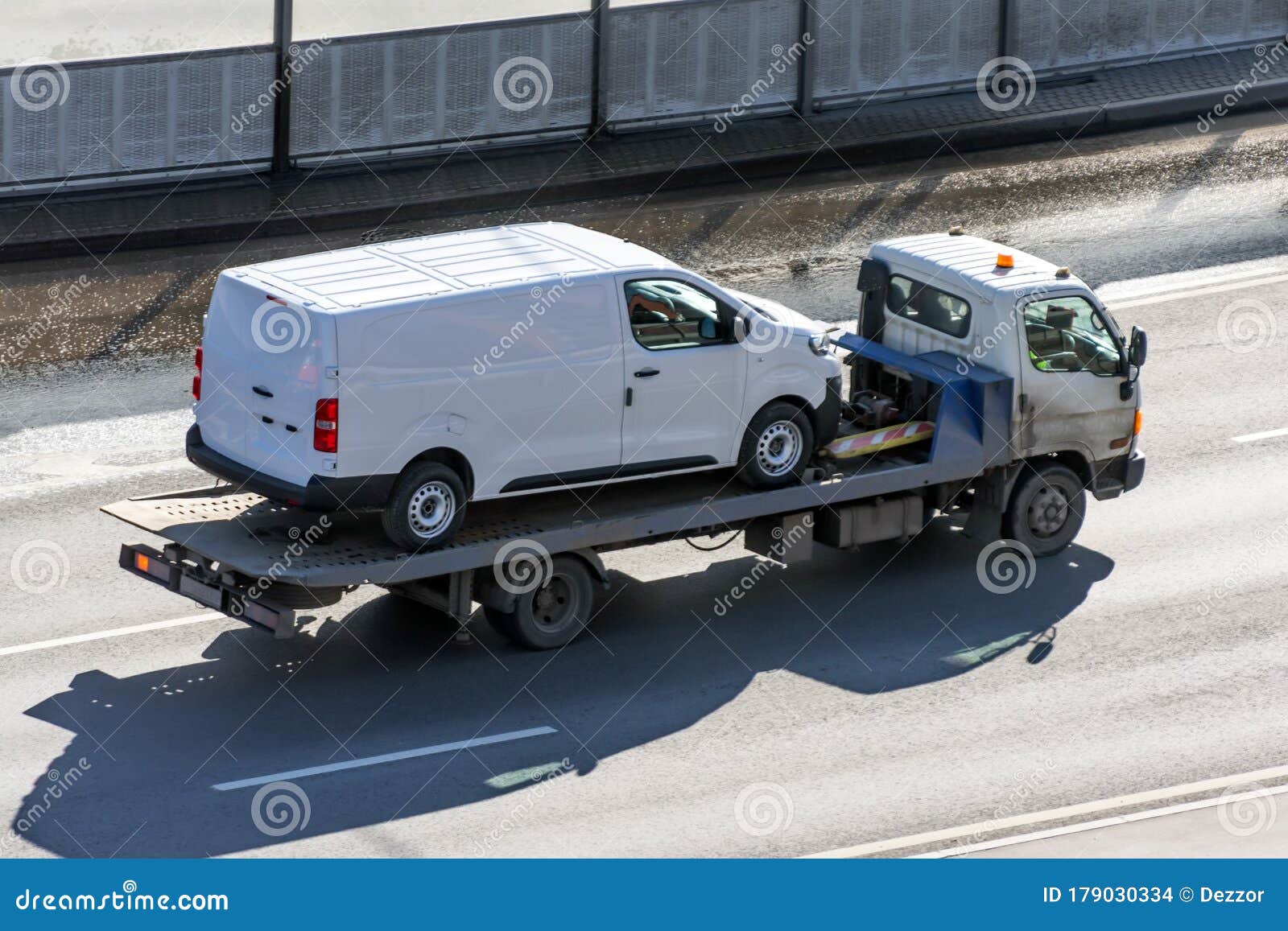 Truck Carrier with Mini Van in the Asphalt Road Stock Photo - Image of ...