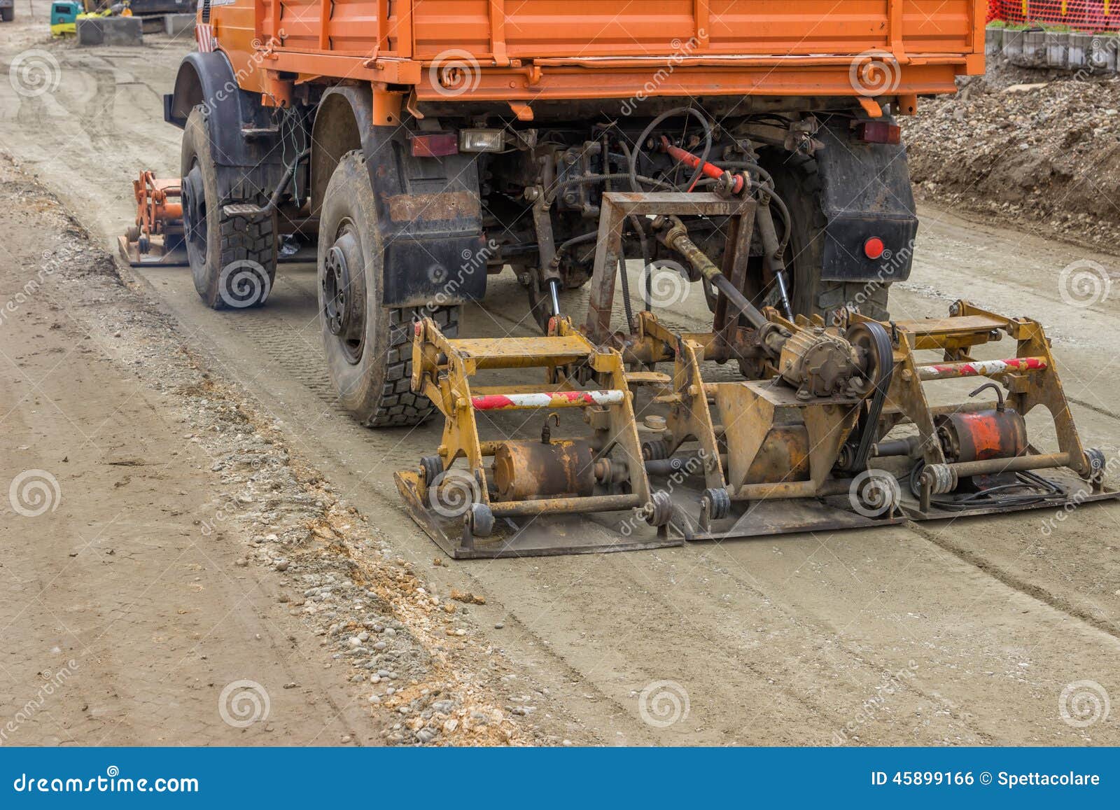 Truck Compacting Gravel at Road Construction Site 2 Stock Photo - Image ...