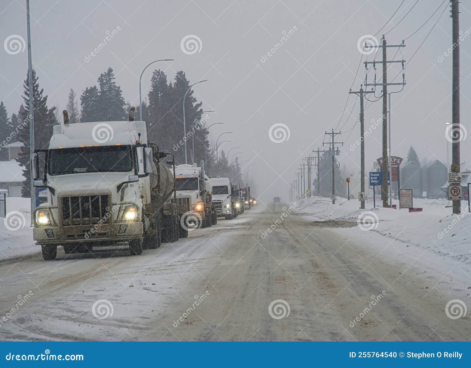 Truck Convey on Highway 63 Alberta in the Snow Editorial Image - Image ...