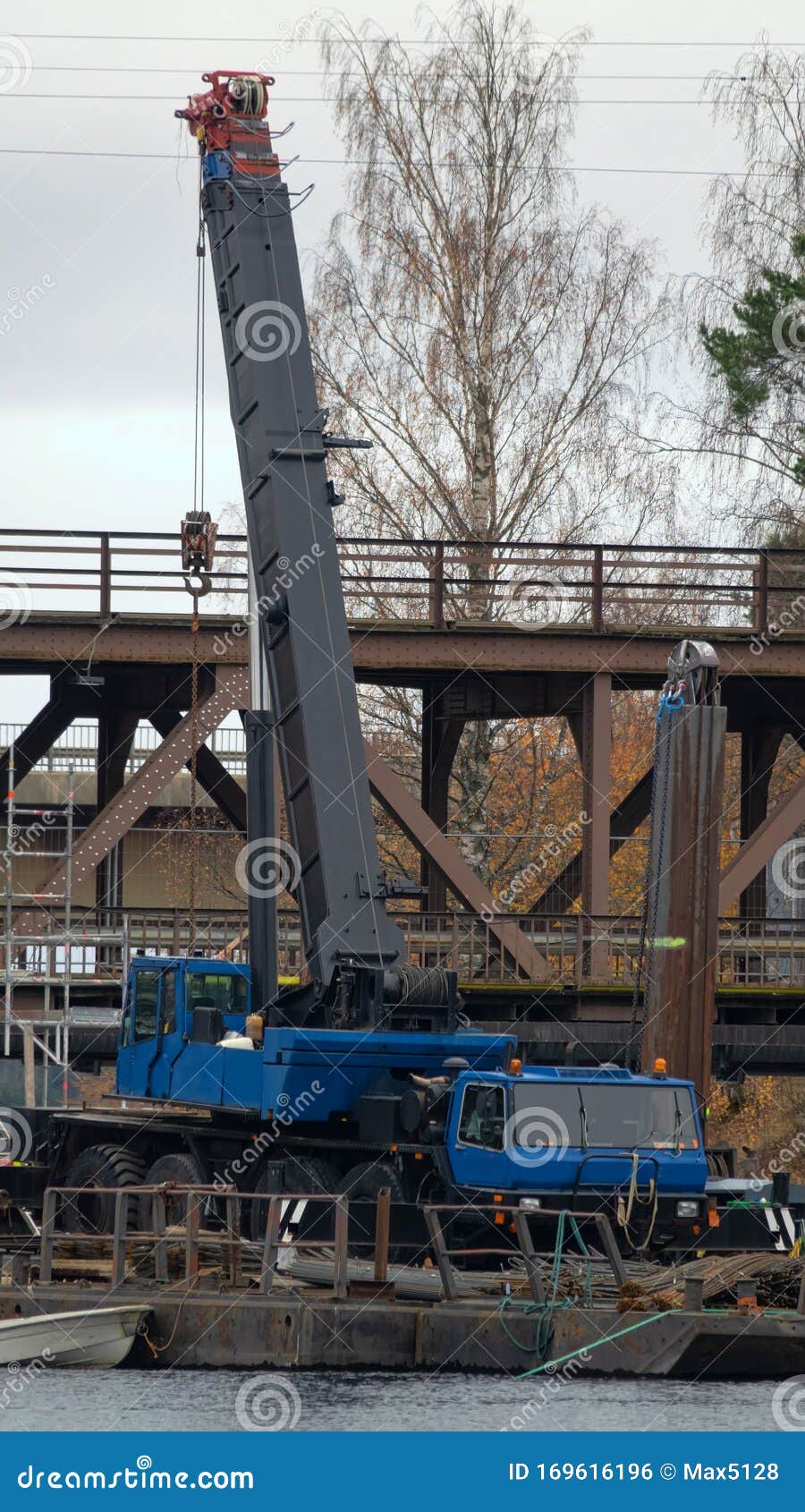 Truck Crane during Loading and Unloading Operations Stock Photo - Image ...