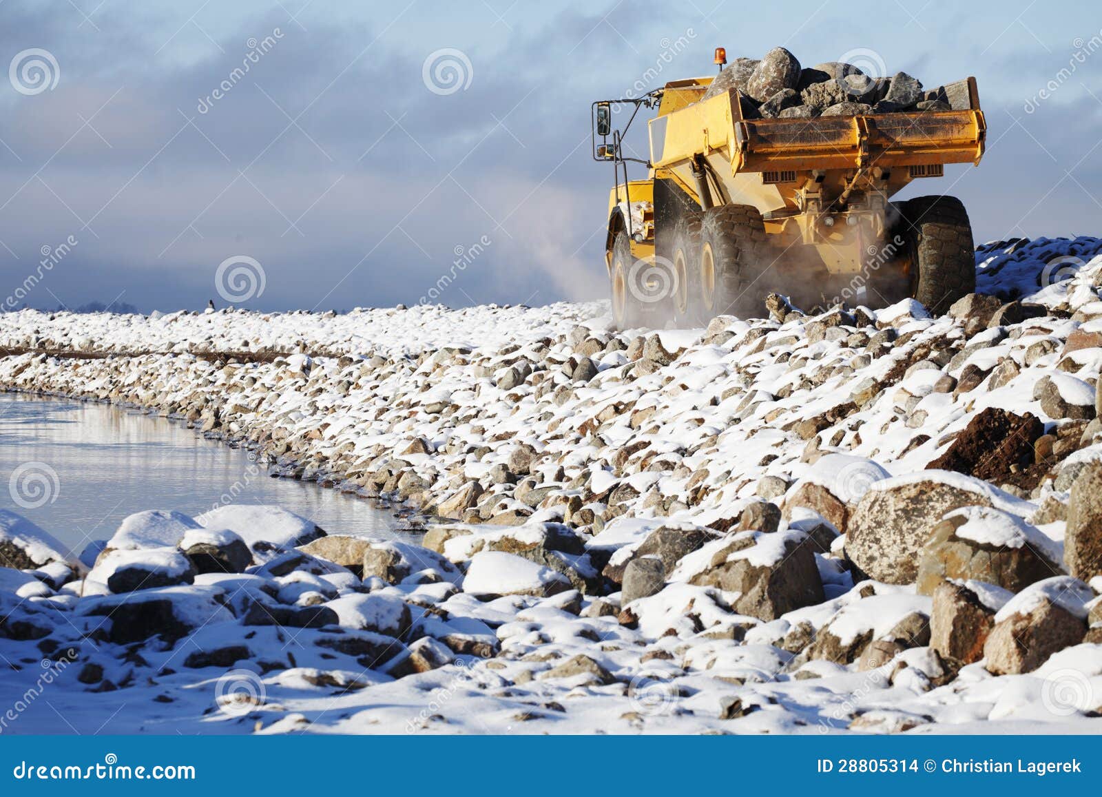 Truck Delivering Rocks for Dredging Stock Photo - Image of ...