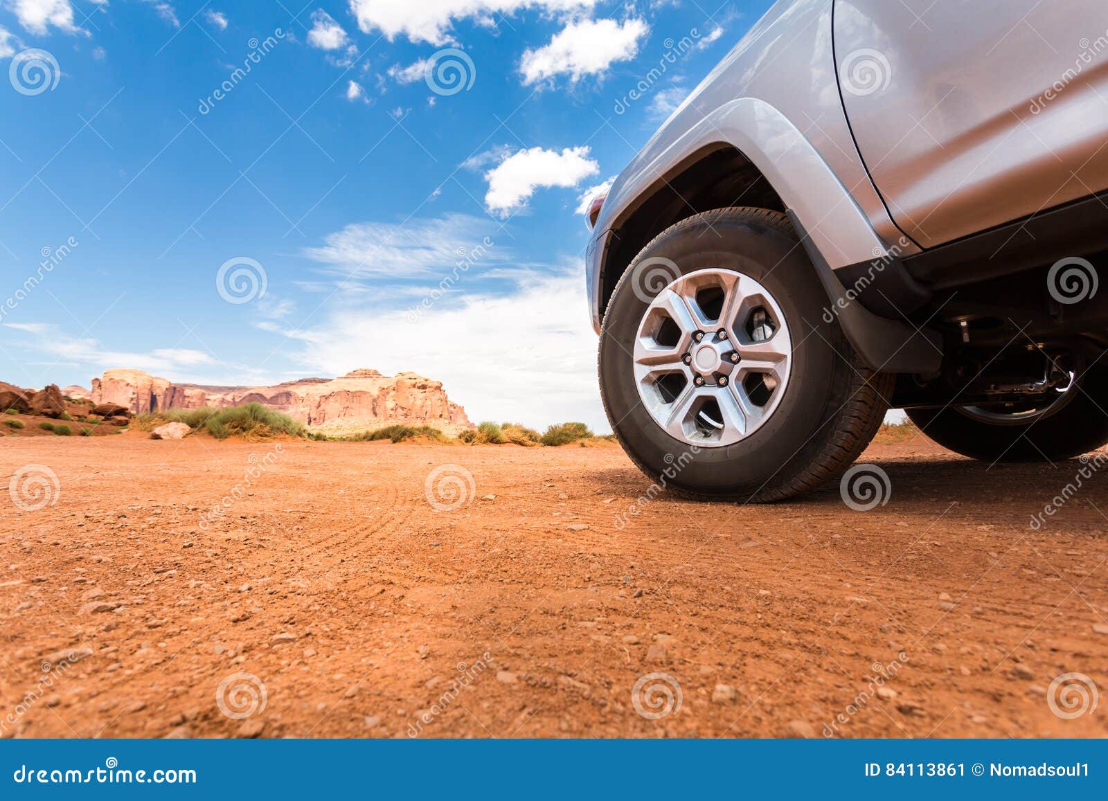 Truck in Desert with Mountains on the Background. Stock Image - Image ...