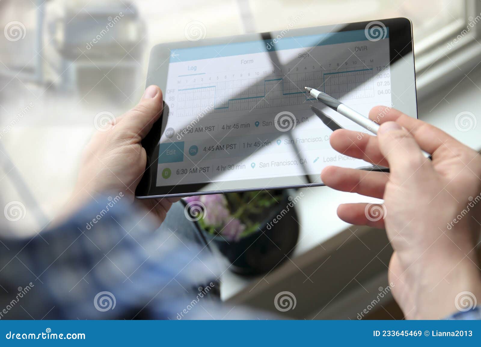 Truck Driver Checking Electronic Logbooks on a Tablet Stock Image ...