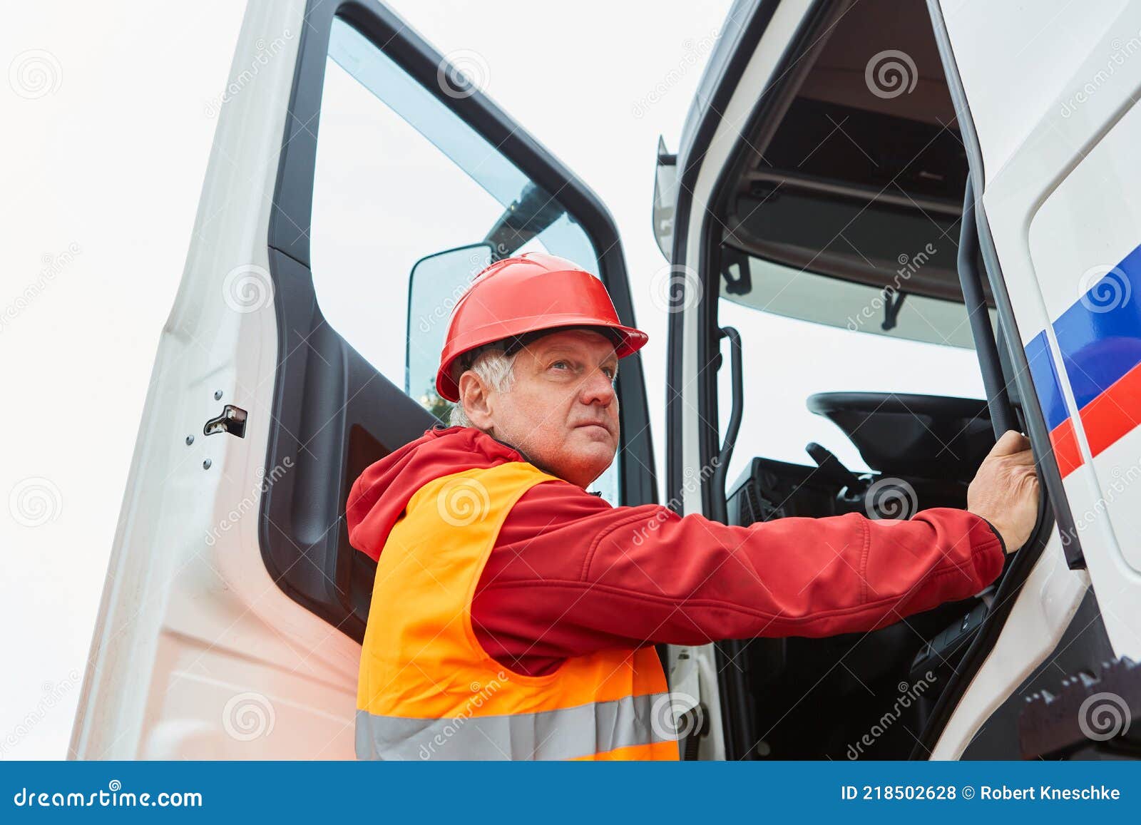 Truck Driver in Front of the Cab on the Construction Site Stock Photo ...