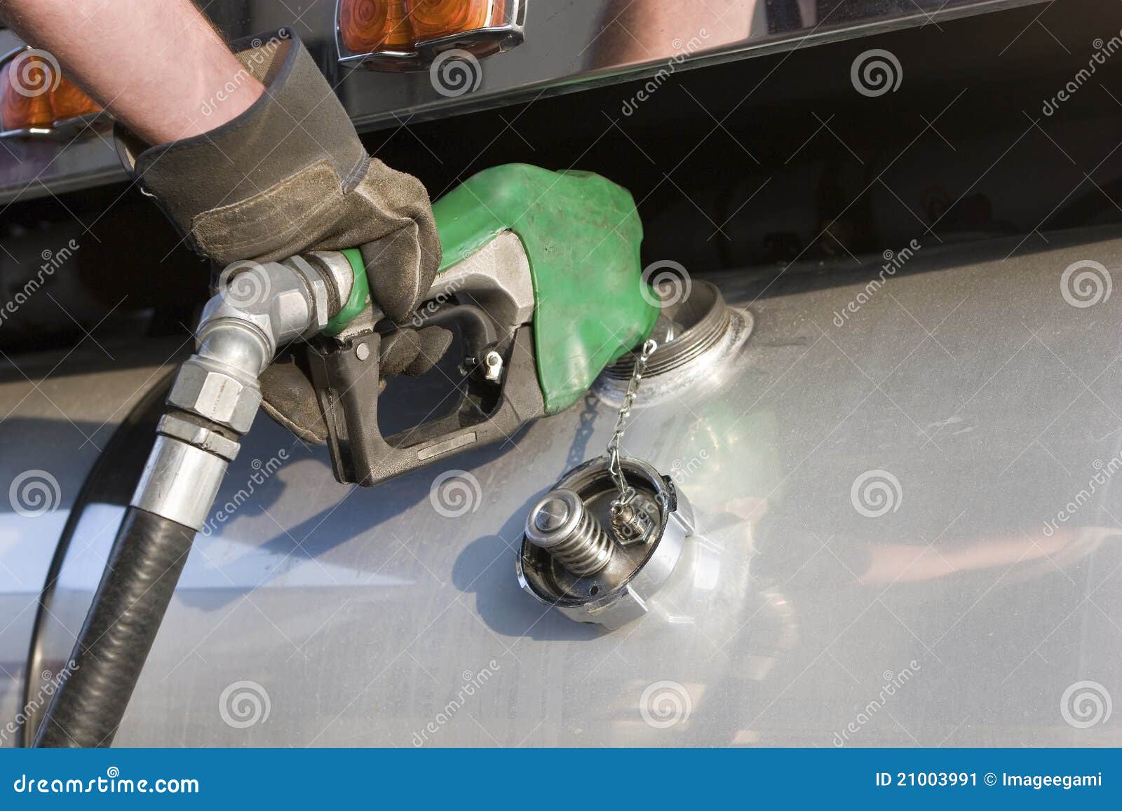 Truck driver pumping gas stock image. Image of fueling - 21003991
