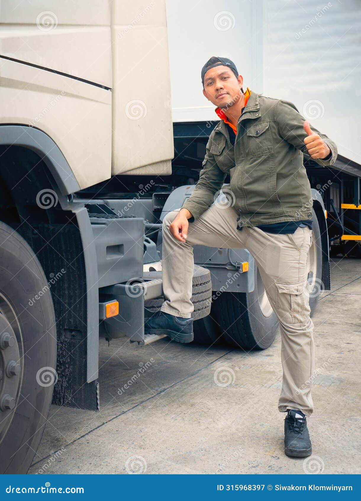 Truck Driver with Semi Truck Giving Thumbs-up Stock Image - Image of ...