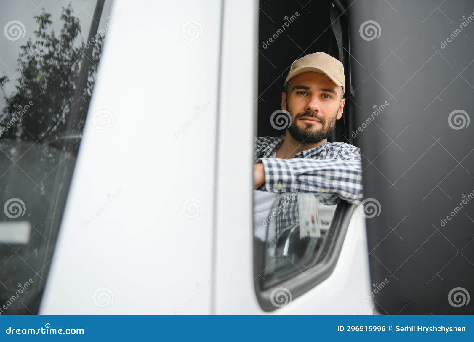 Truck Driver Sitting in Cab Stock Photo - Image of semitruck, male ...