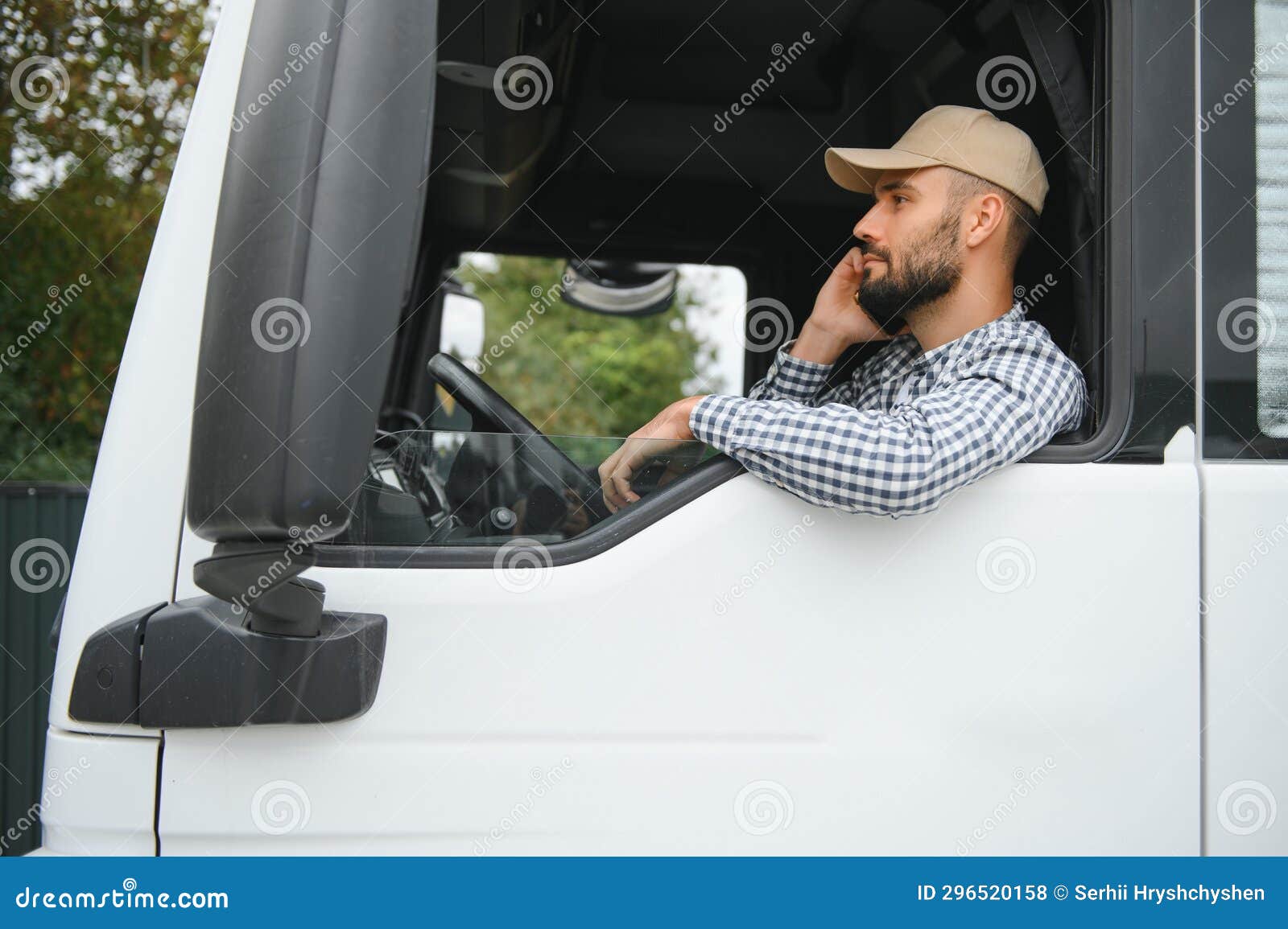 Truck Driver Sitting in Cab Stock Photo - Image of road, semitruck ...