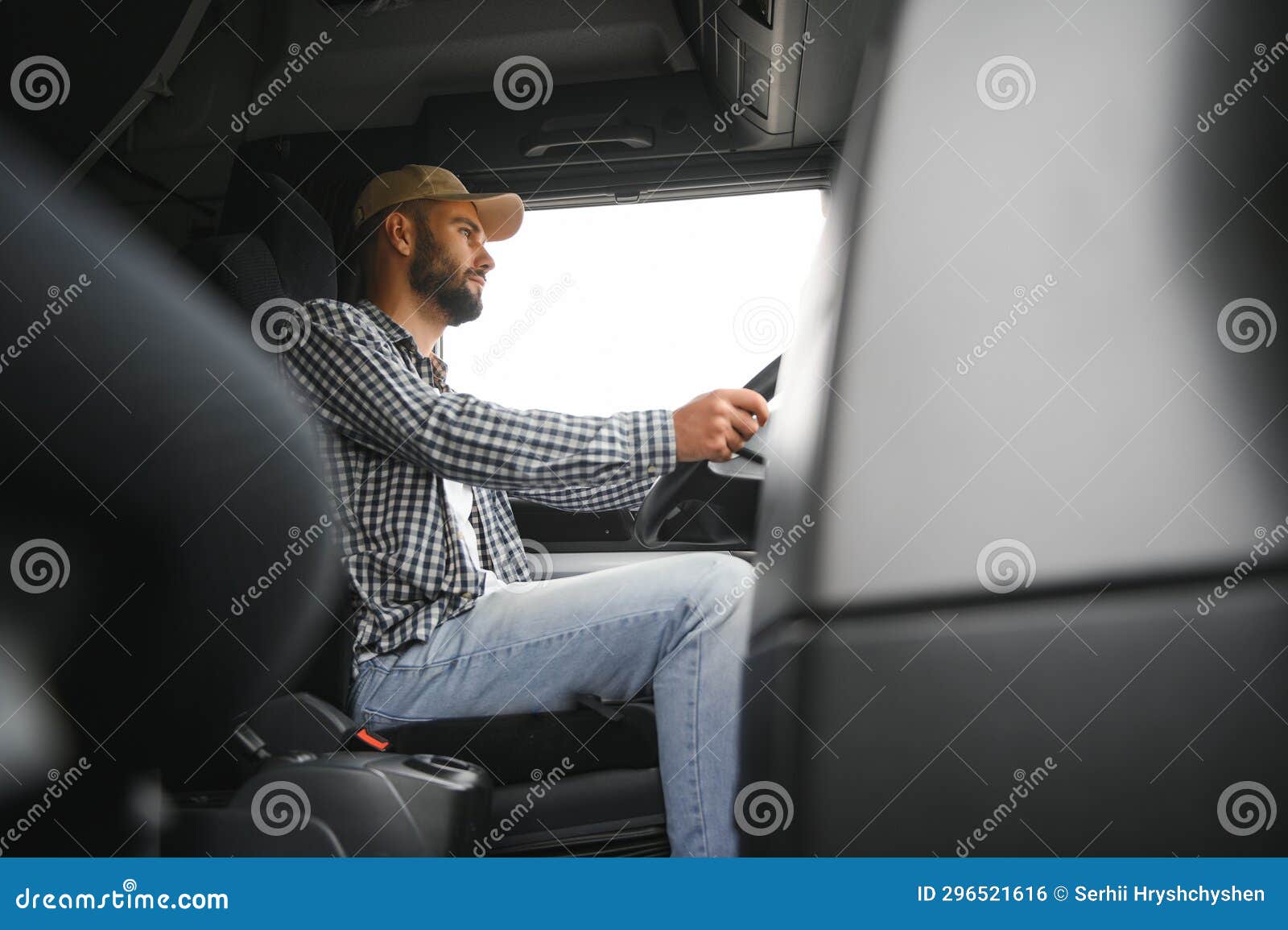 Truck Driver Sitting in Cab Stock Photo - Image of angle, stop: 296521616