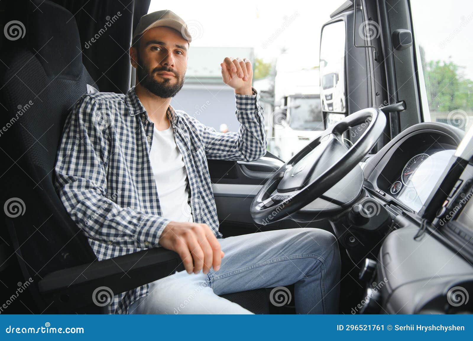 Truck Driver Sitting in Cab Stock Image - Image of brown, hand: 296521761