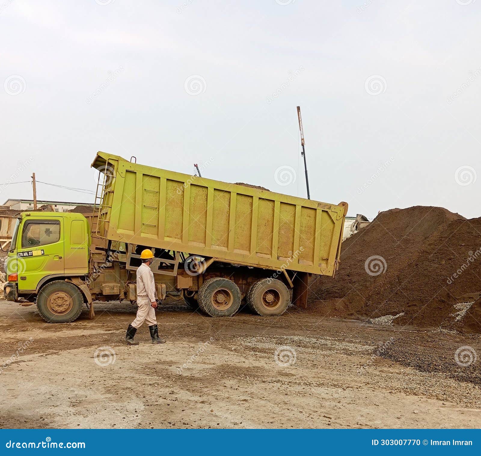 A Truck Driver Will Unload Material Editorial Image - Image of material ...