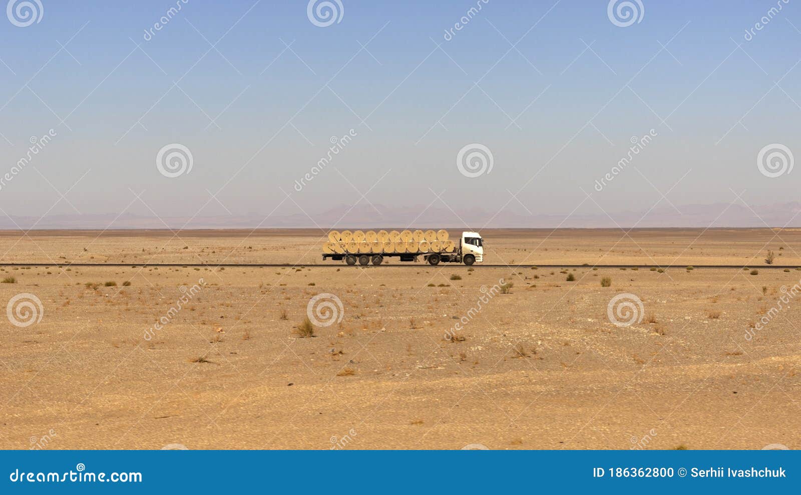 A Truck on a Highway in Desert Stock Photo - Image of iranian, trucks ...