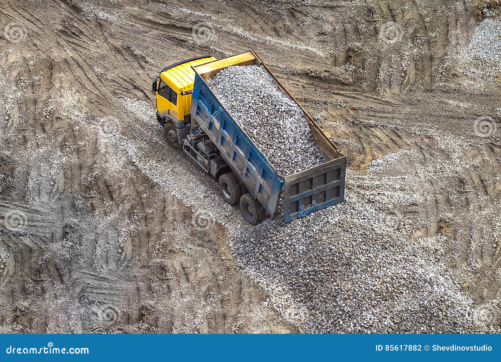 Truck With A Breakstone On A Road In The City During Road Construction ...