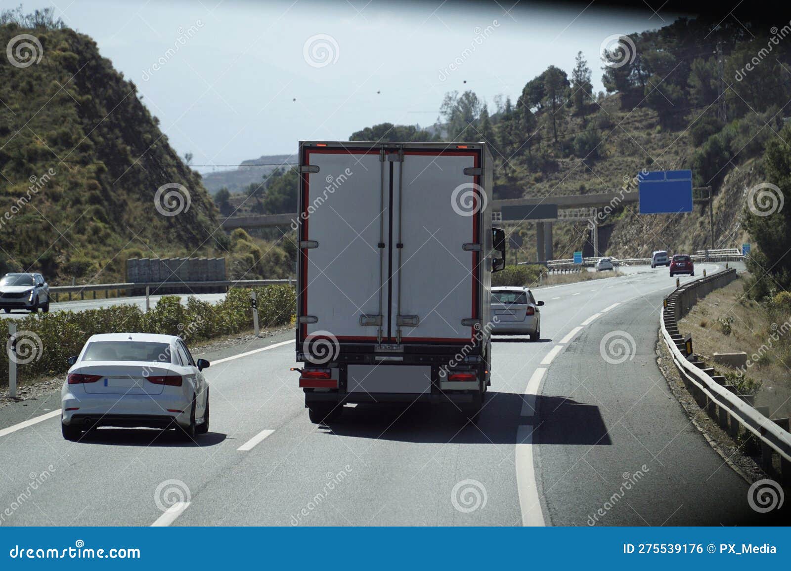Truck on a Highway - Back View Stock Photo - Image of logistics ...