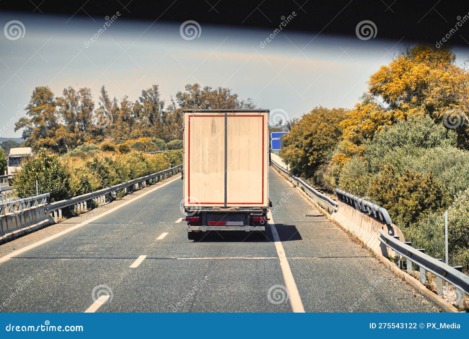 Truck on a Highway - Back View Stock Photo - Image of wheeler ...