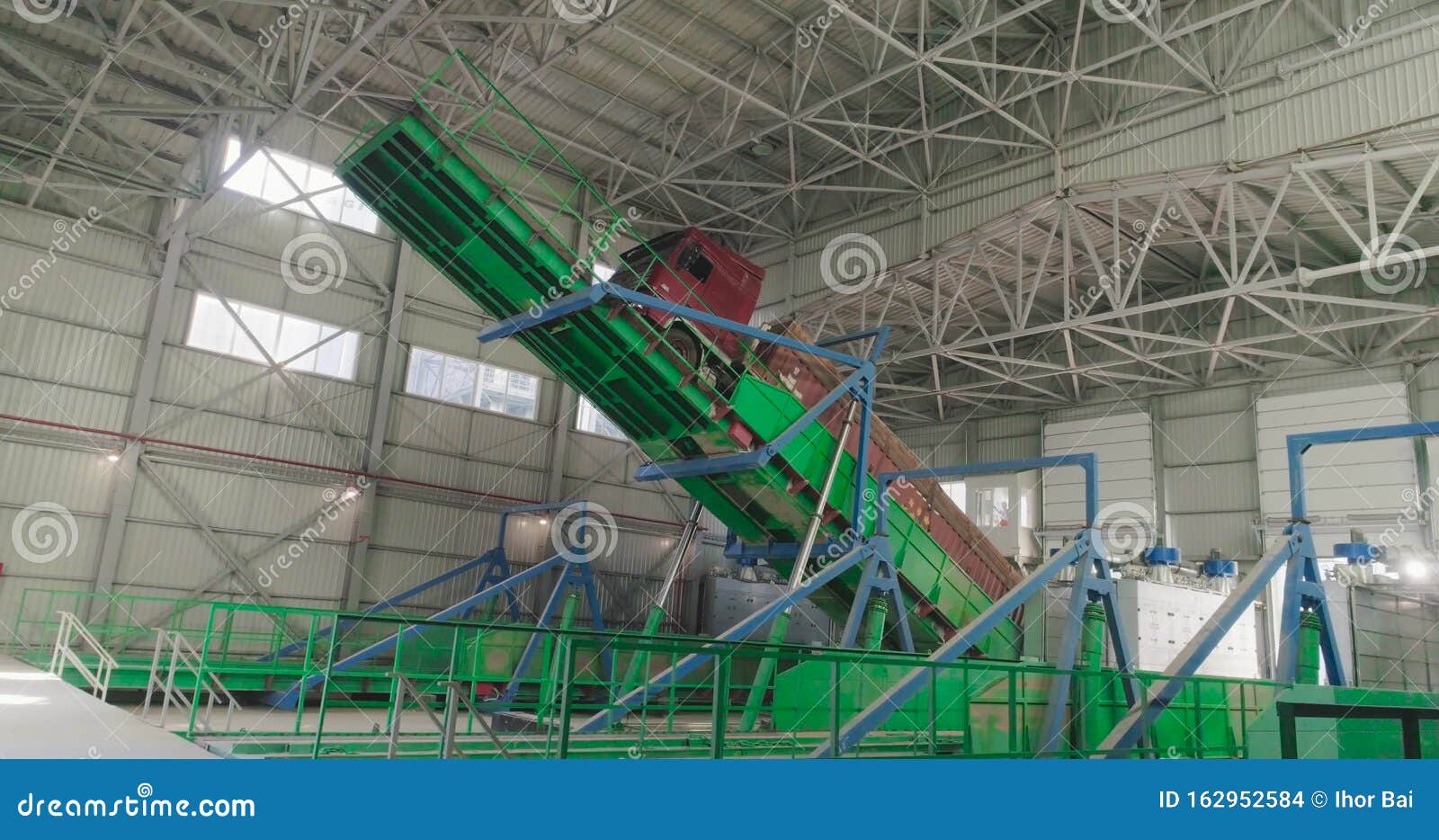 A Truck is Lifted on a Platform for Unloading Grain. Unloading Wheat ...