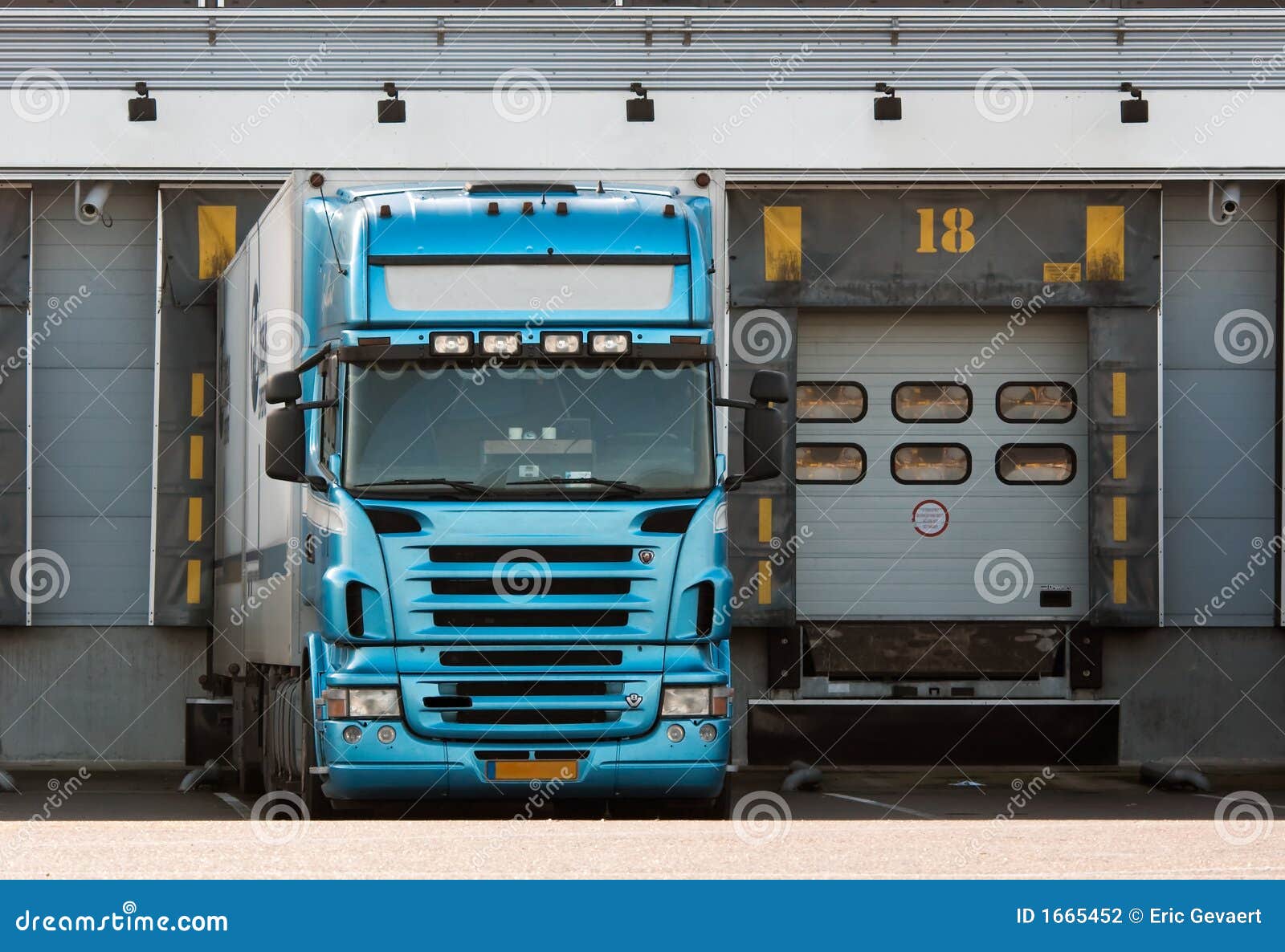 Truck at loading dock stock photo. Image of shipper, shipping - 1665452