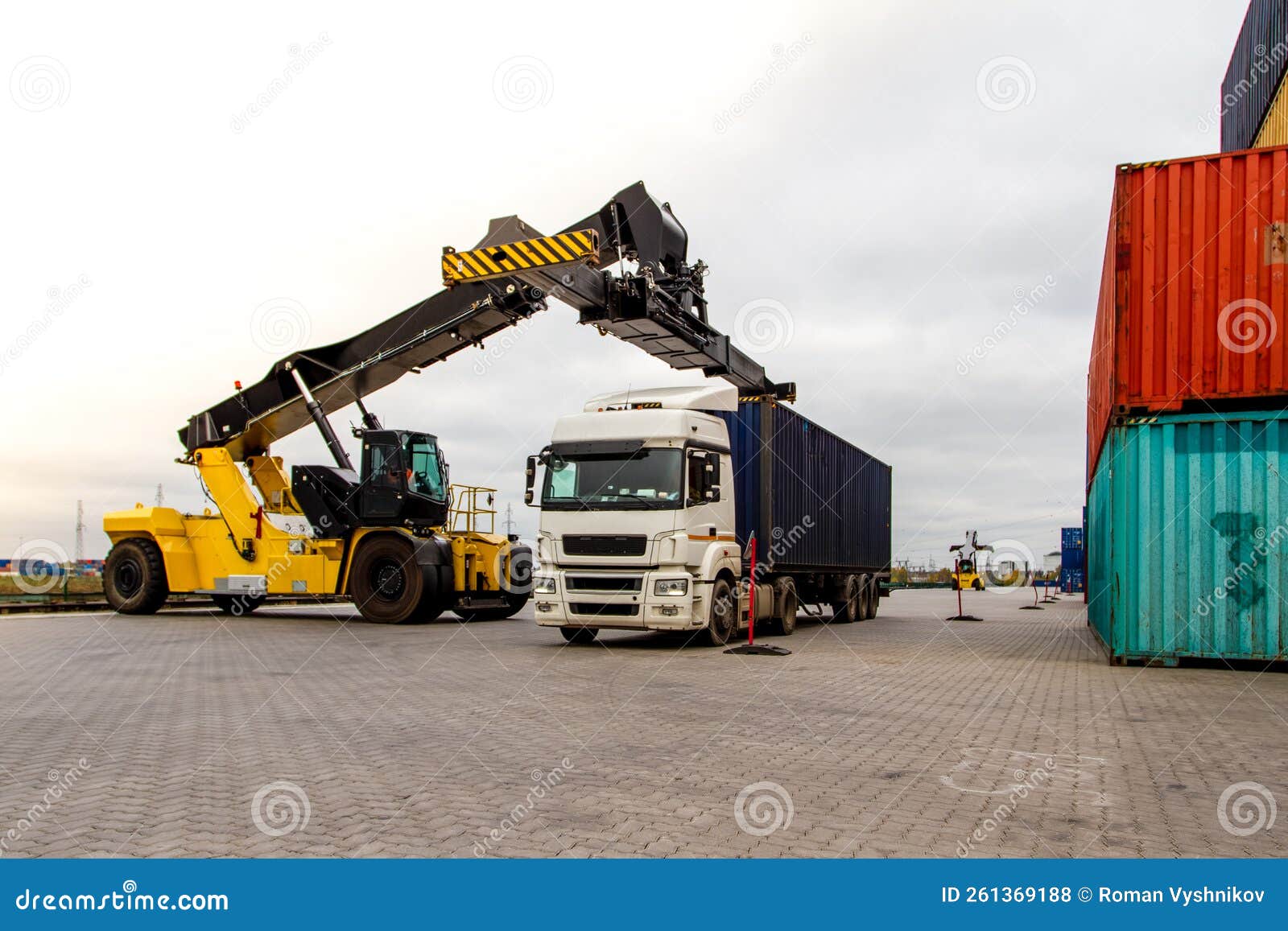 Truck while Loading in Logistic Shipping Yard with Cargo Container ...