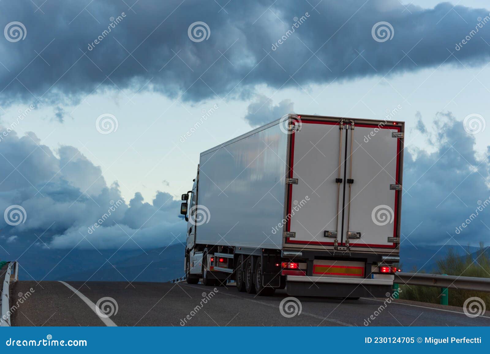 Truck with Refrigerated Semi-trailer Stock Image - Image of storm, dusk ...