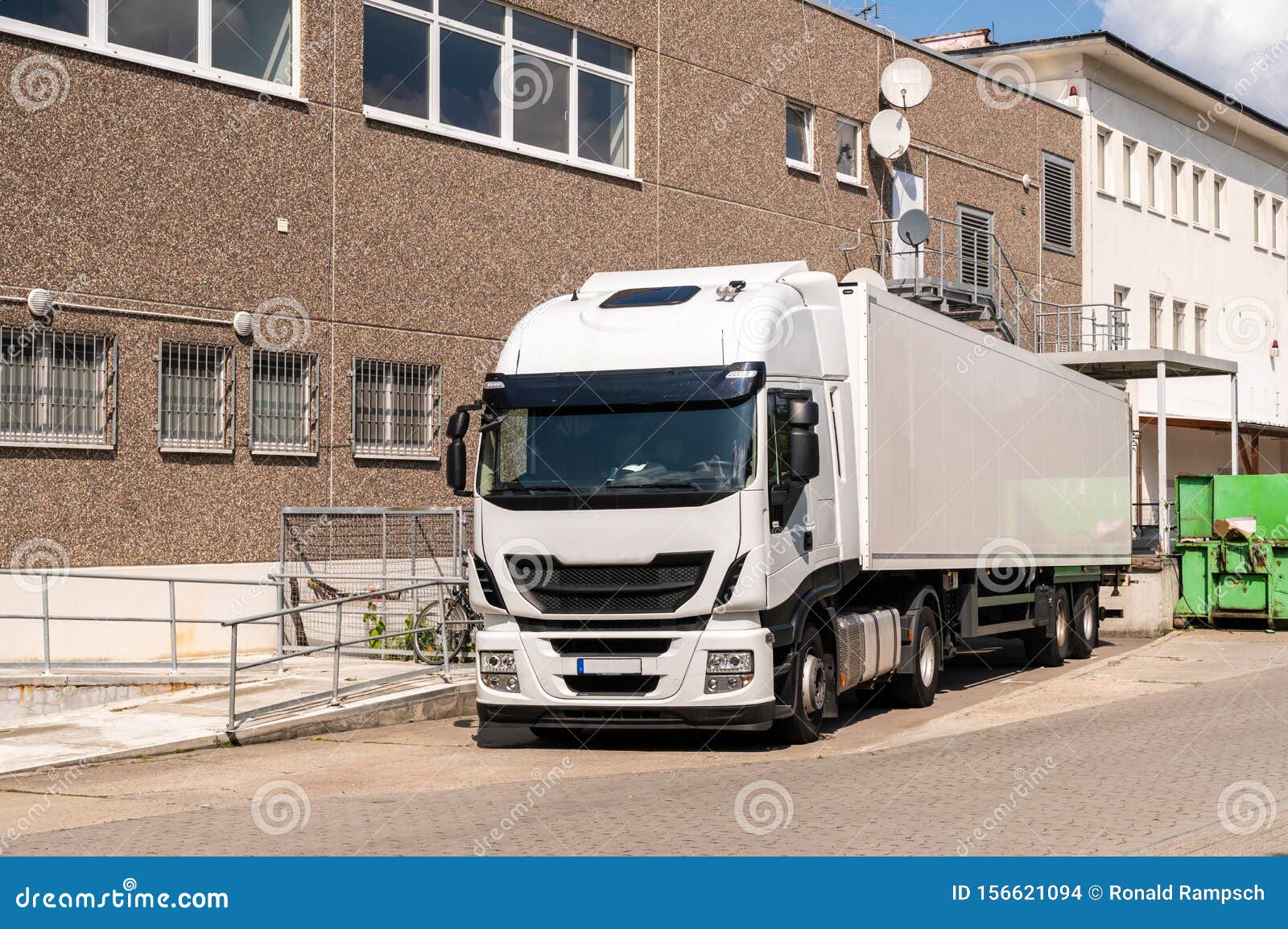 A Truck at a Small Loading Ramp Stock Photo - Image of transportation ...