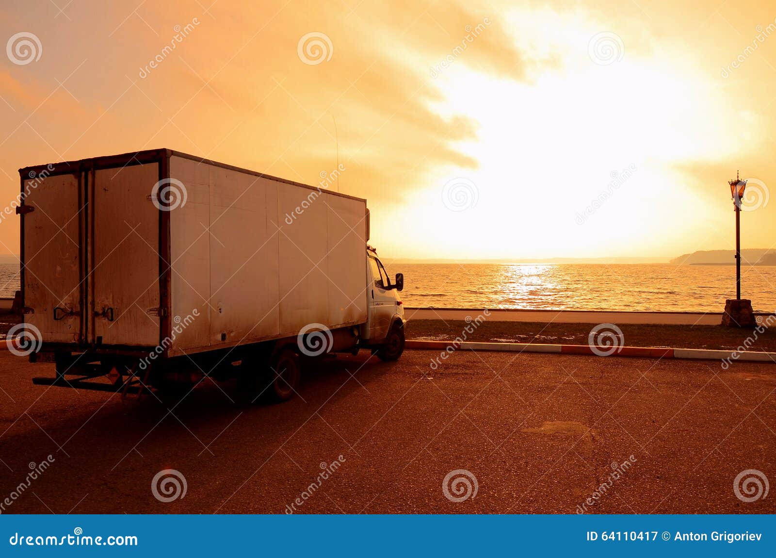 Truck at sunset stock image. Image of promenade, light - 64110417