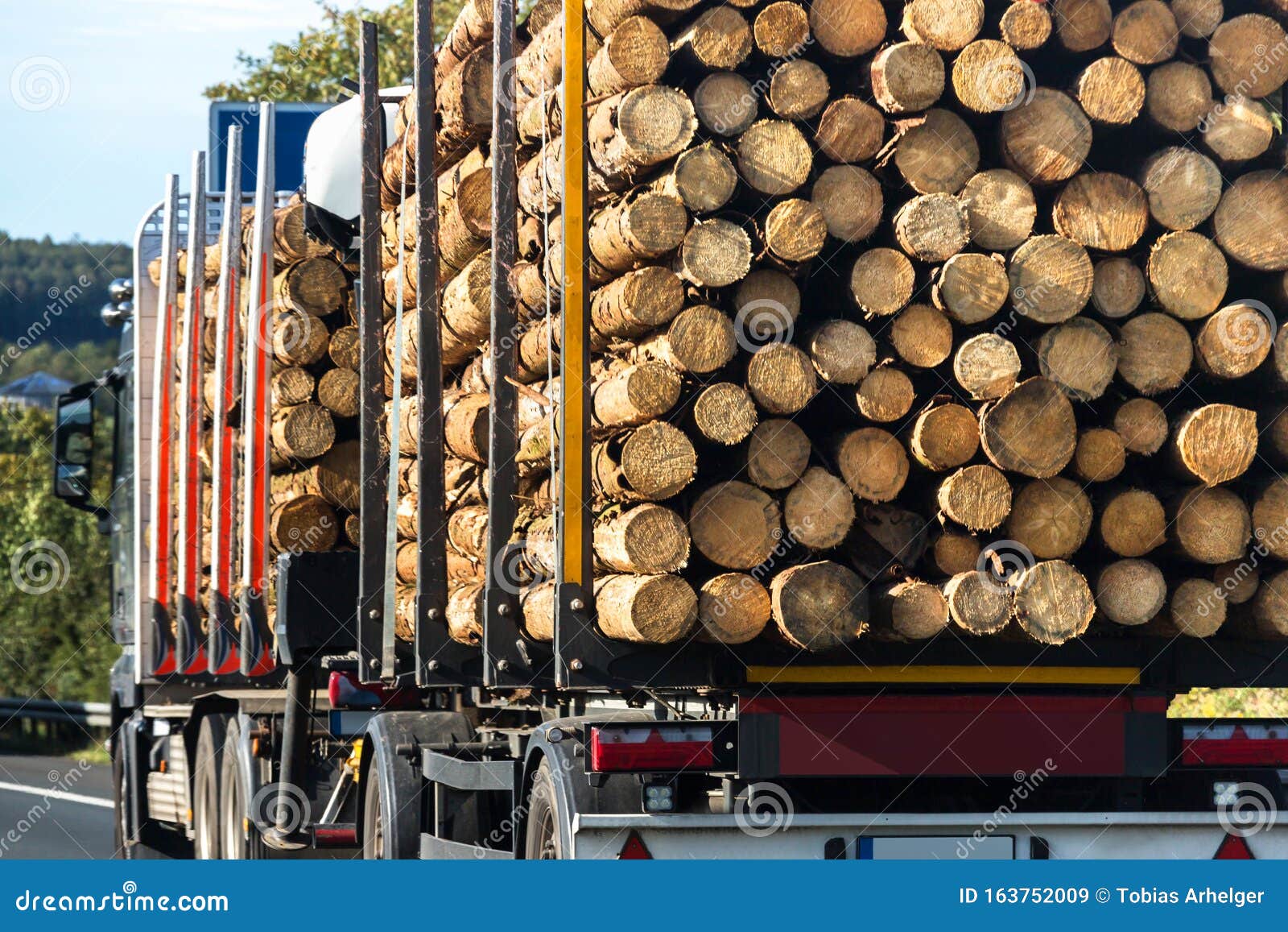 Truck with Tree Trunks on the Highway Stock Image - Image of tree ...