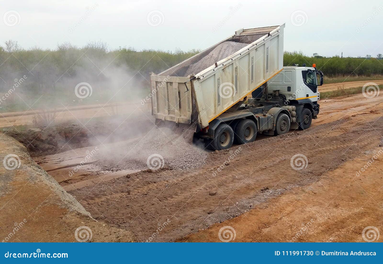 Truck unload gravel stock photo. Image of grade, bunch - 111991730
