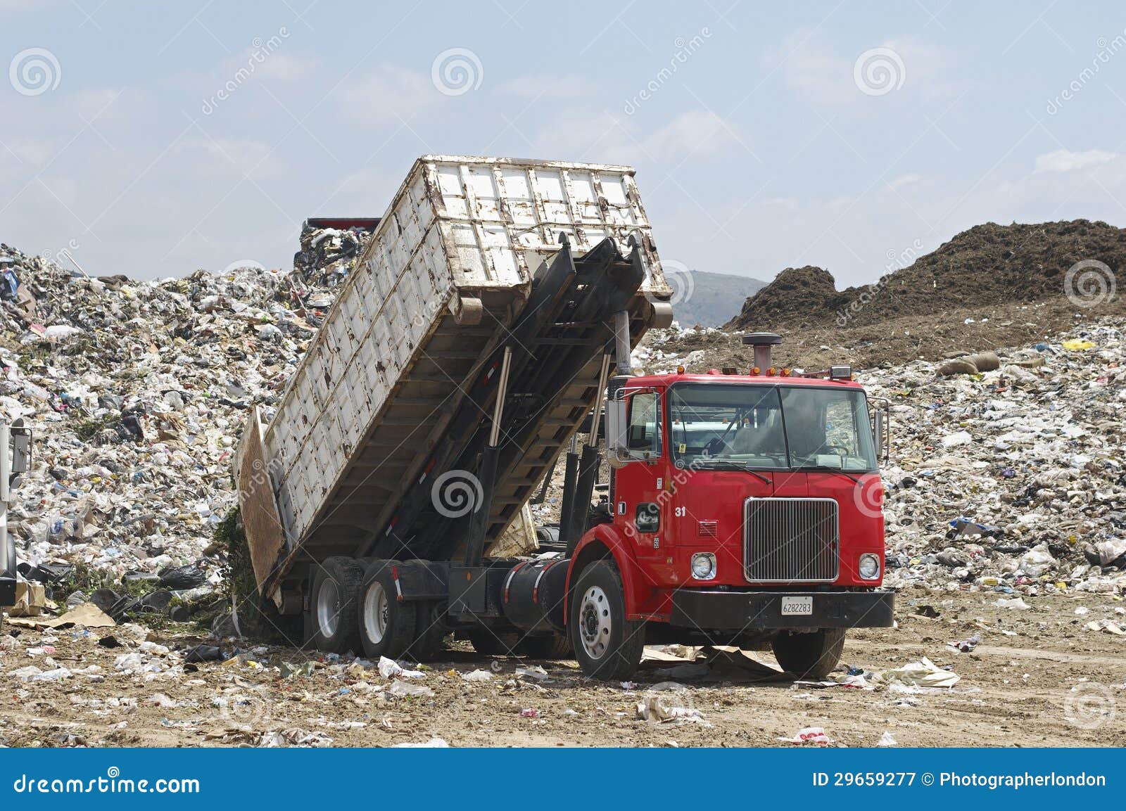 Truck Unloading Garbage at Site Stock Image - Image of dirty, rubbish ...