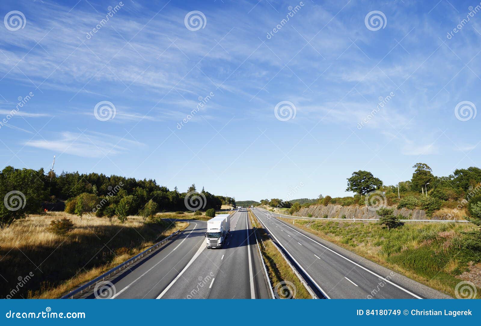 Trucking on scenic freeway stock image. Image of transport - 84180749