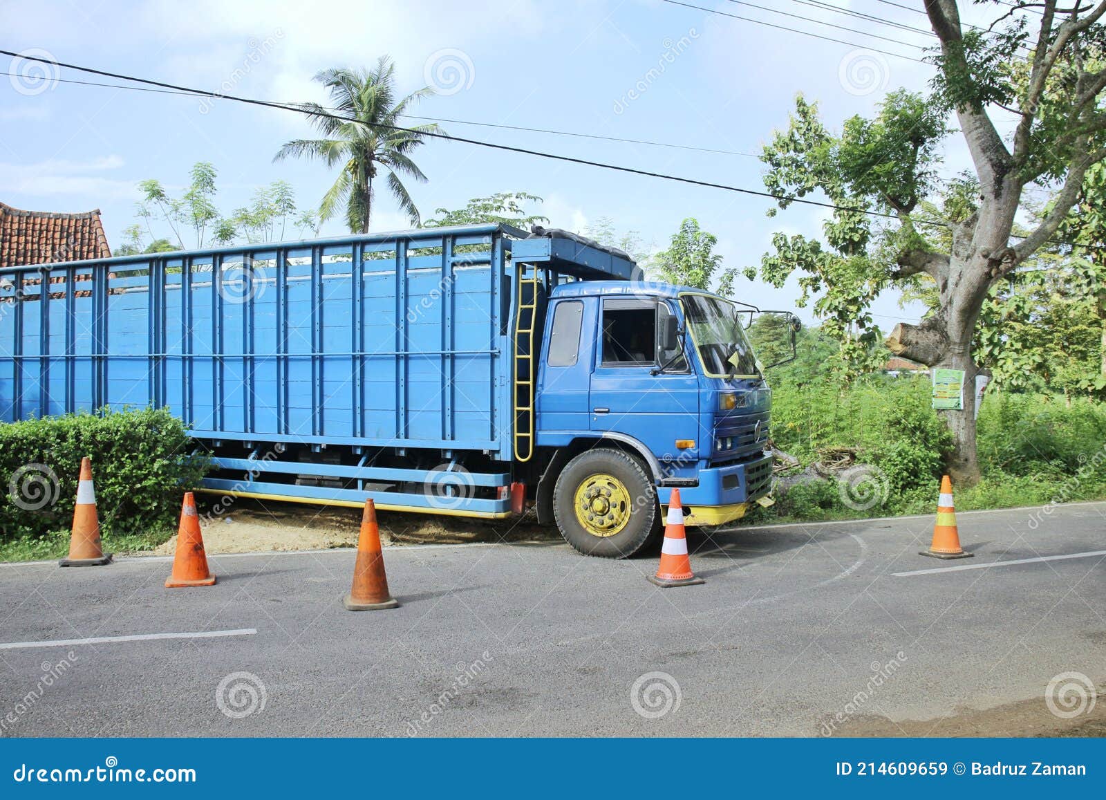 Trucks Blocking the Road stock image. Image of countryside - 214609659