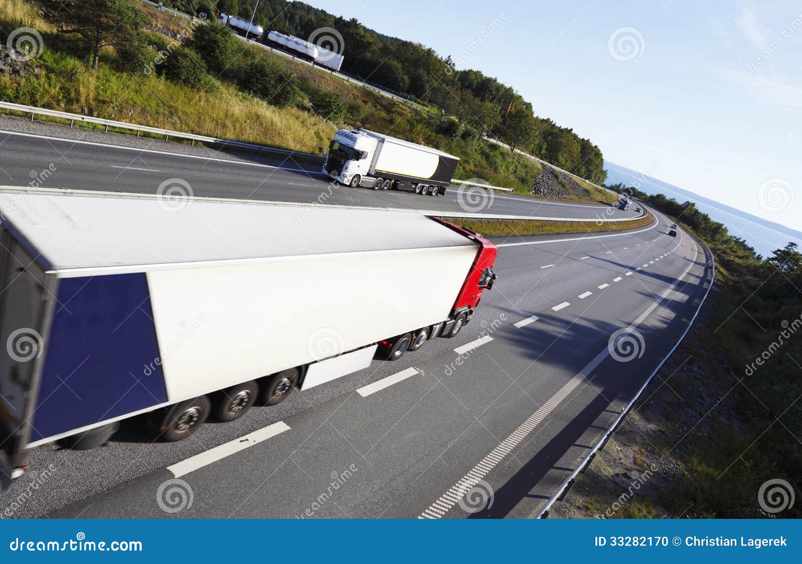 Trucks Driving a Beautyful Freeway Route Stock Photo - Image of ...
