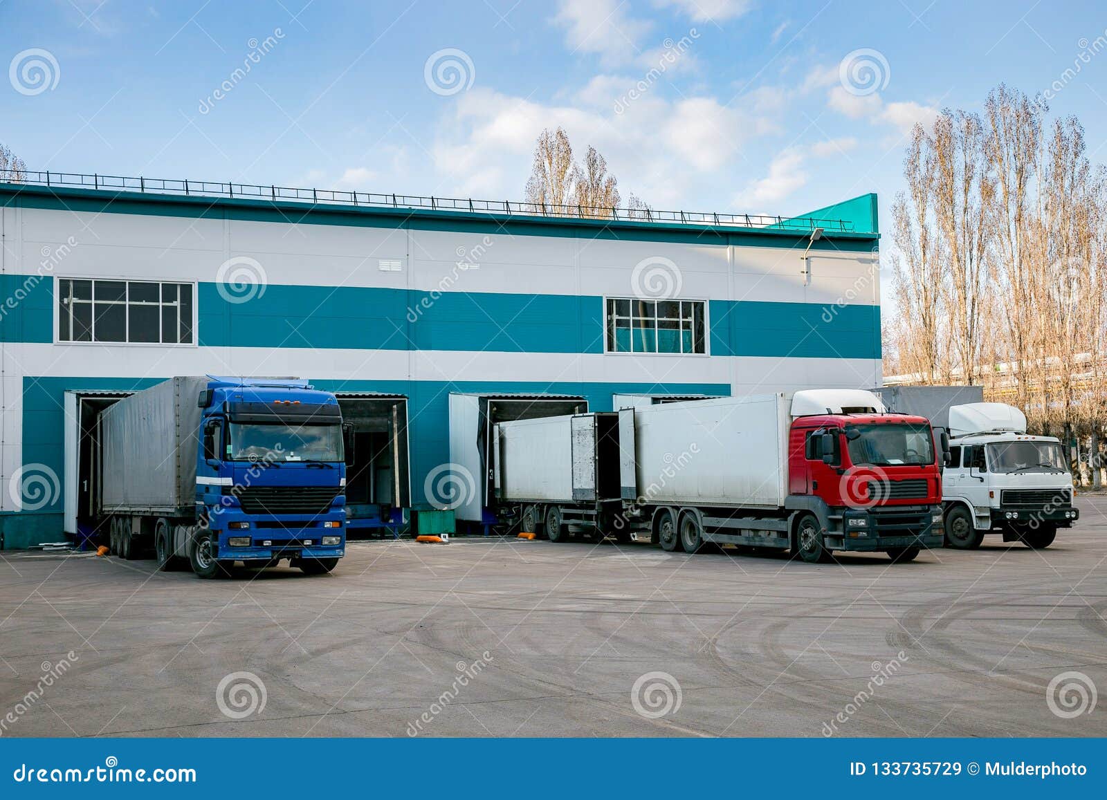 Trucks Loading in Warehouse for Cargo Transportation Stock Image ...