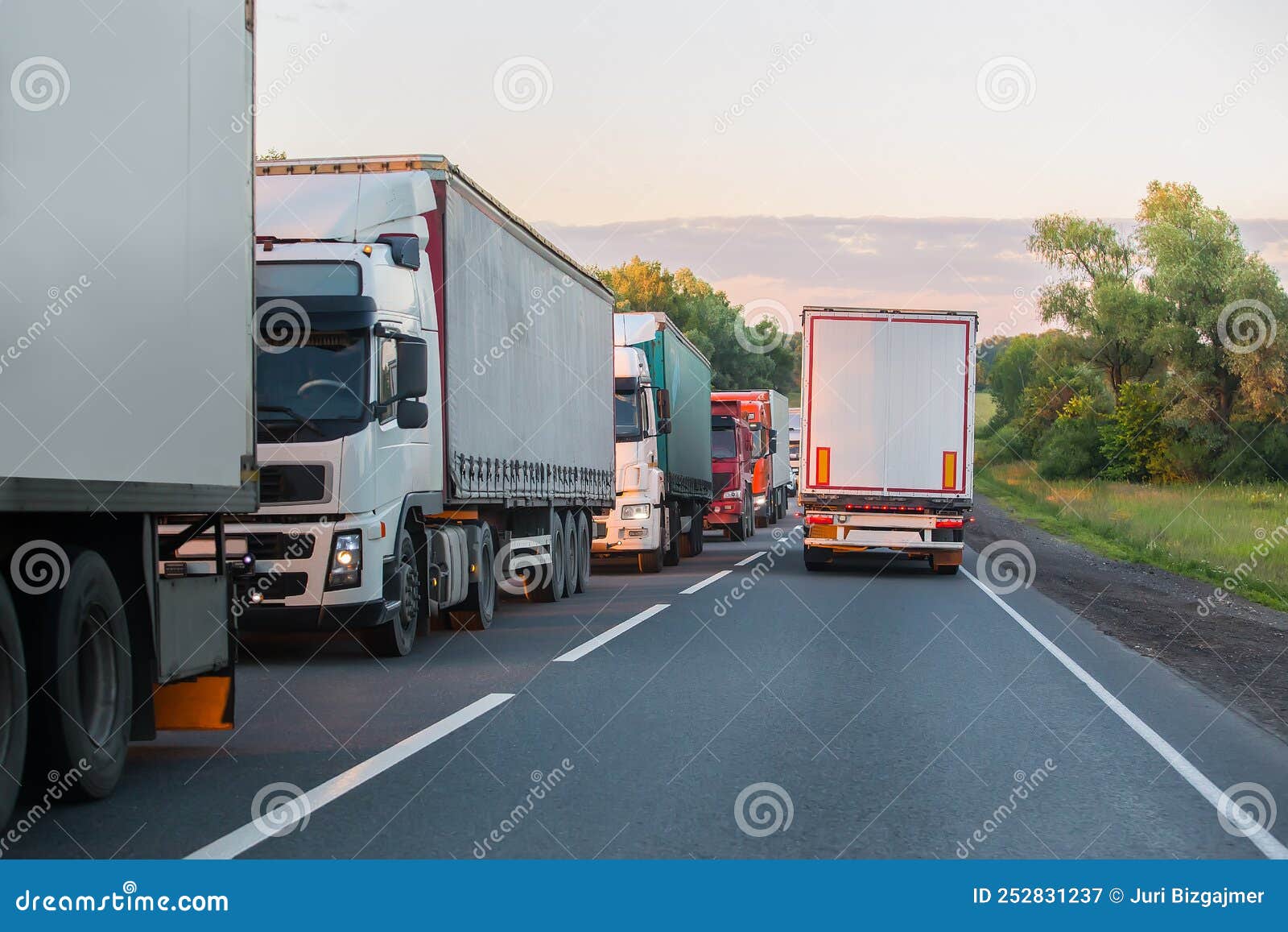 Trucks Move in Opposite Directions on Highway Stock Image - Image of ...