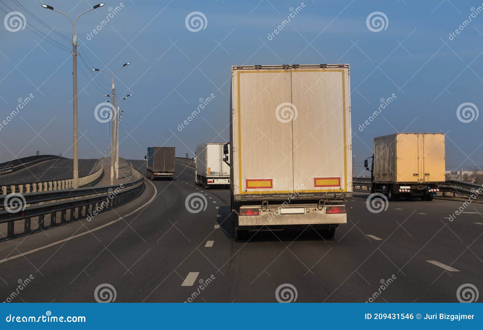 Trucks are Moving Across the Bridge on Highway Stock Photo - Image of ...