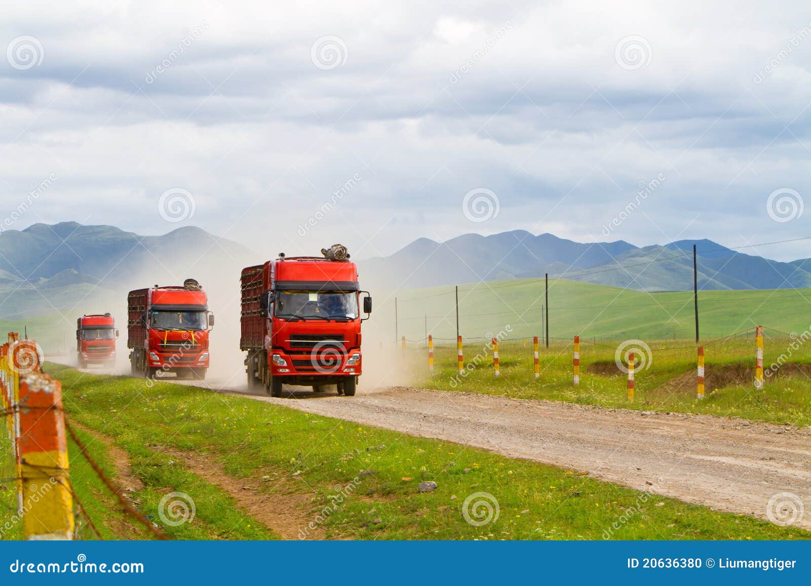 Trucks Passing through Grassland Stock Photo - Image of supply ...